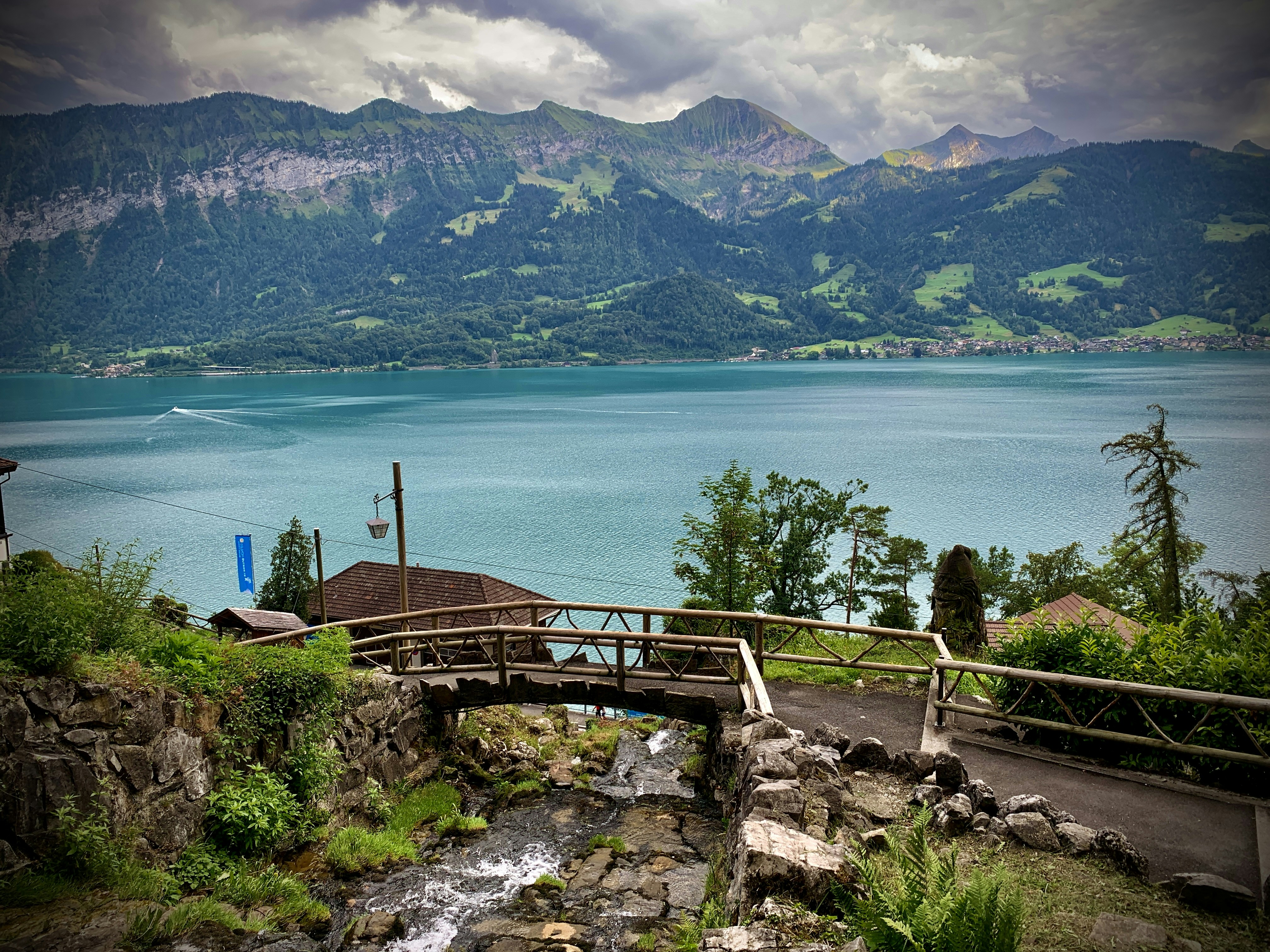 A scenic view of a body of water with mountains in the background