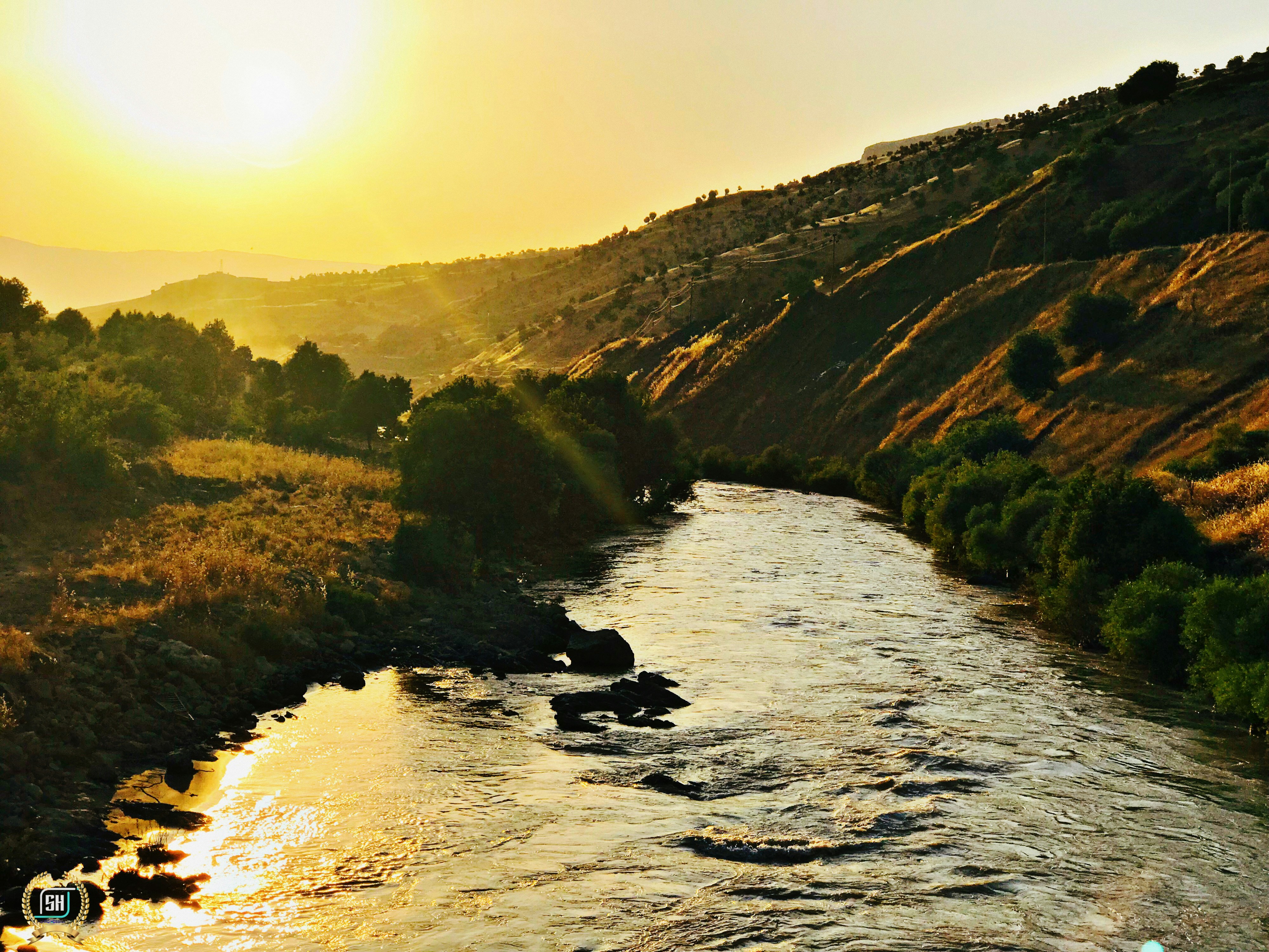 Green grass field near body of water during daytime photo – Free Iraq ...
