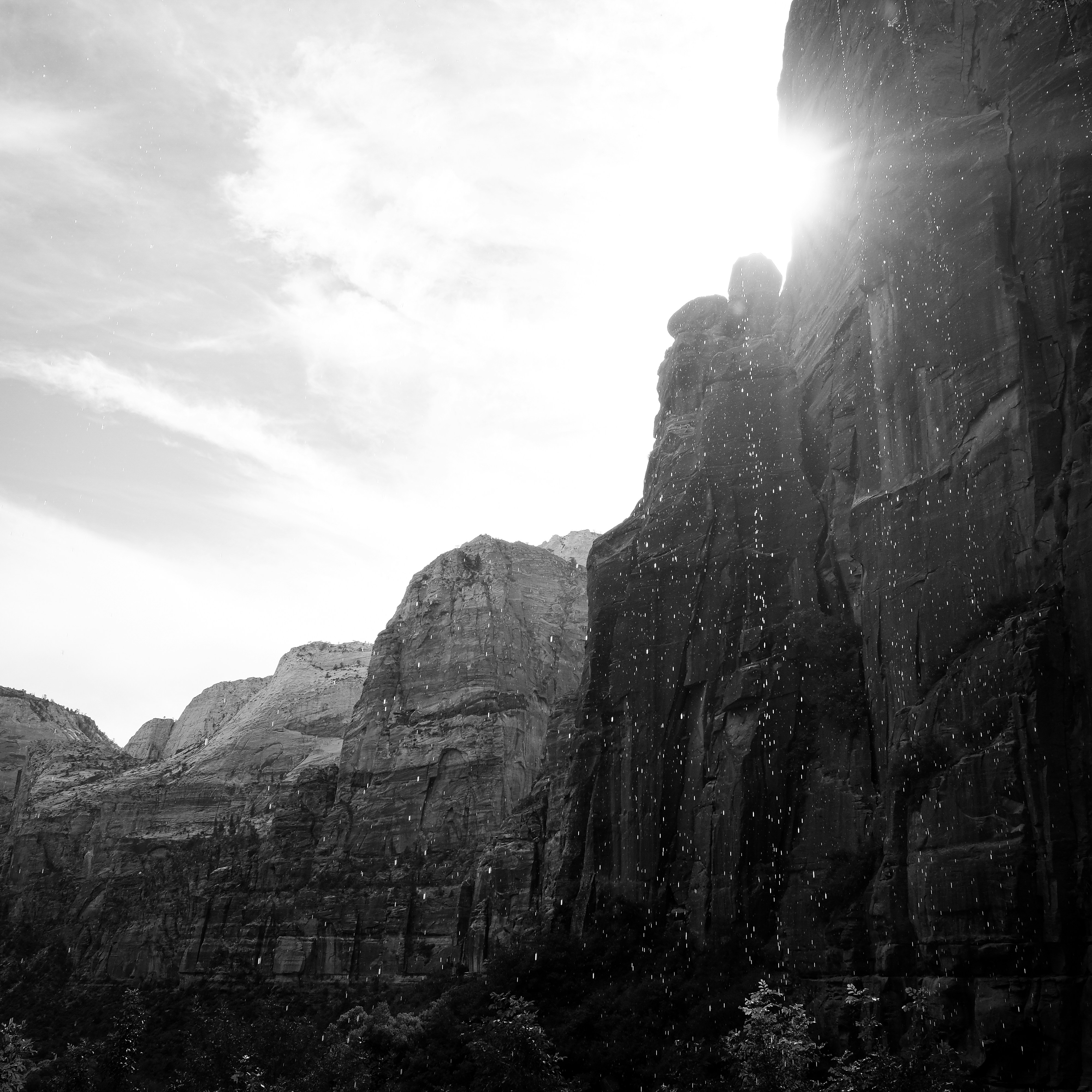 Sunburst on a Rain-Slick Cliff