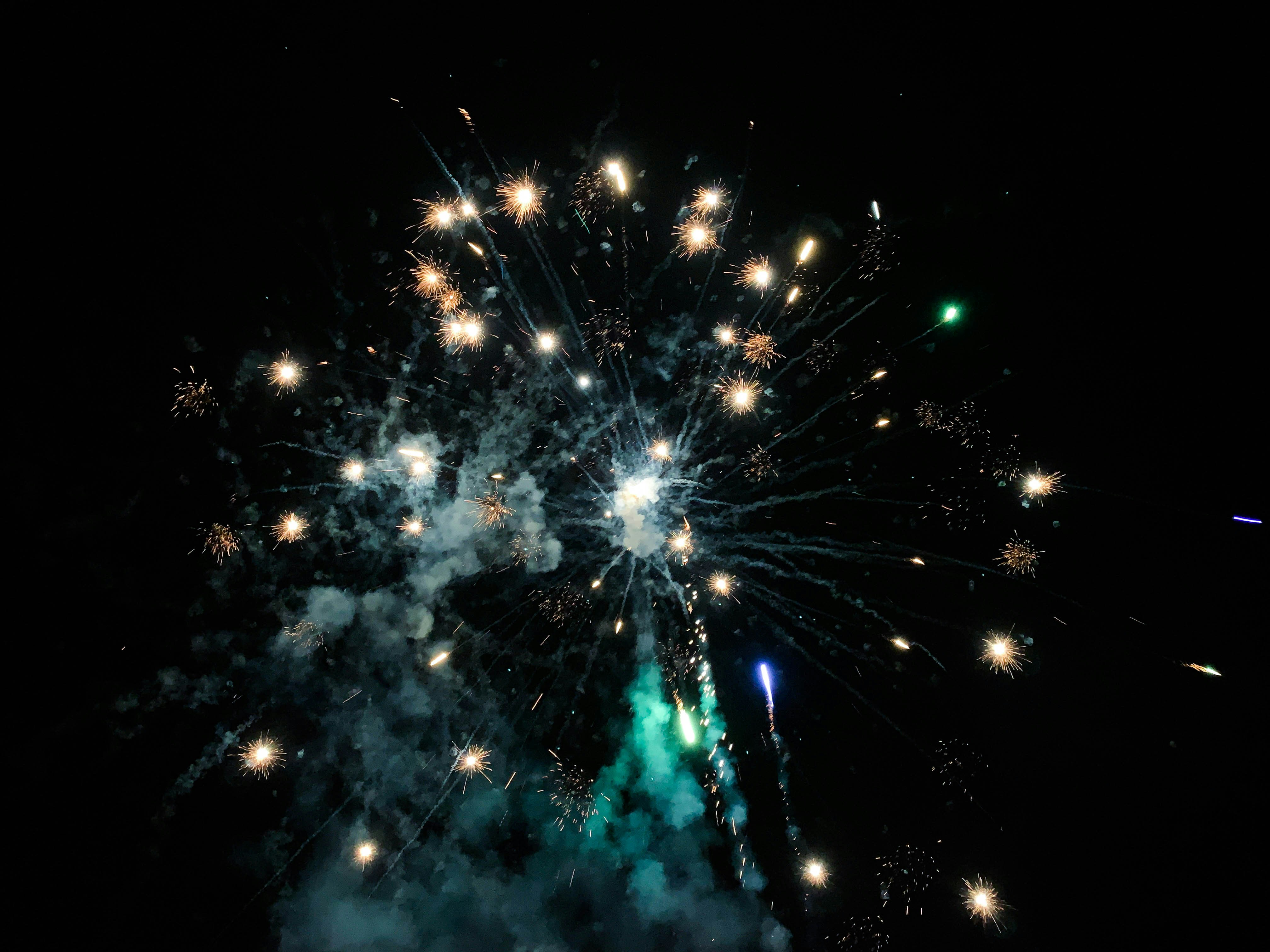 White and blue fireworks display during nighttime photo – Free Grey ...