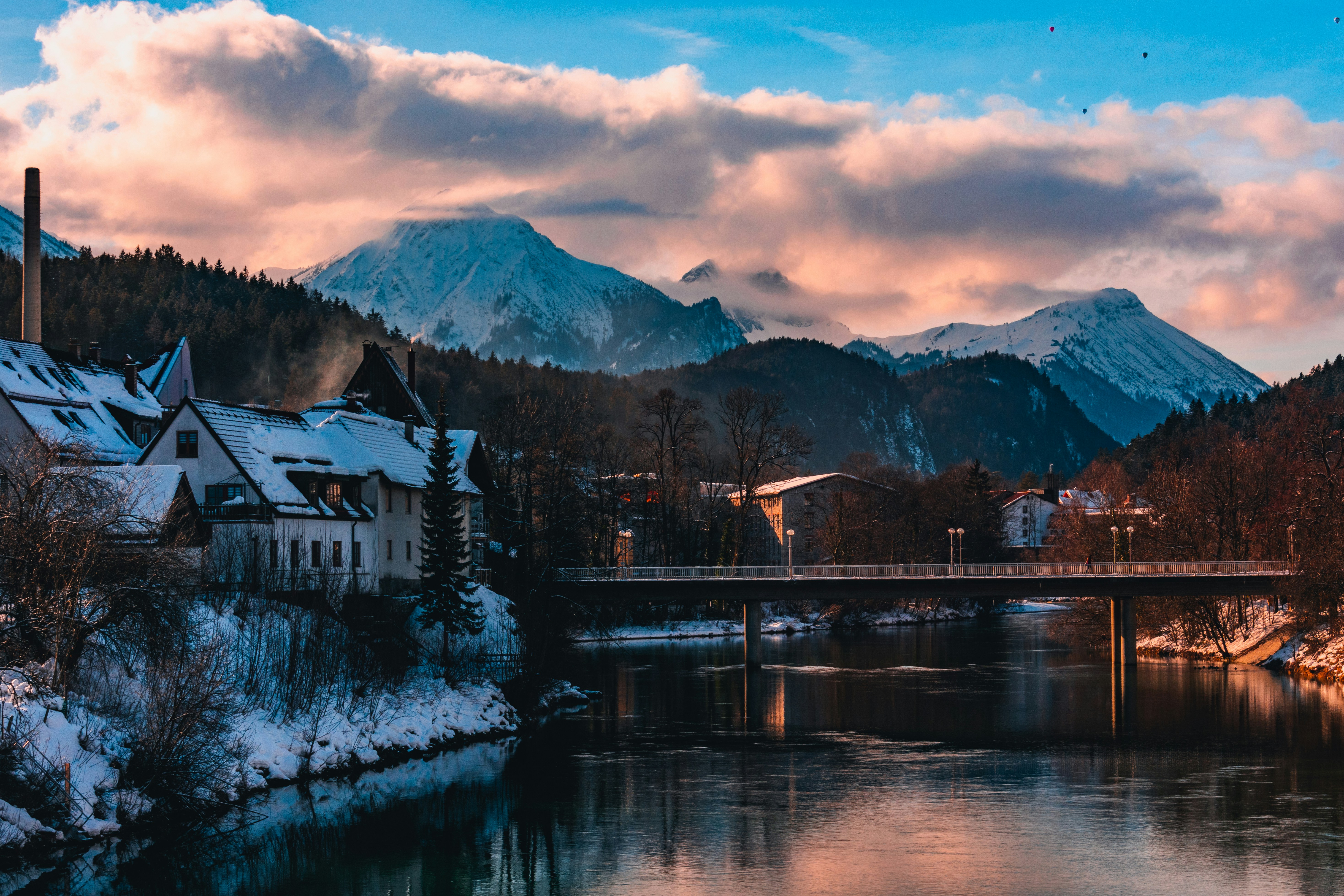 Twilight Over Snowbound Alpine Village and the Golden Peak