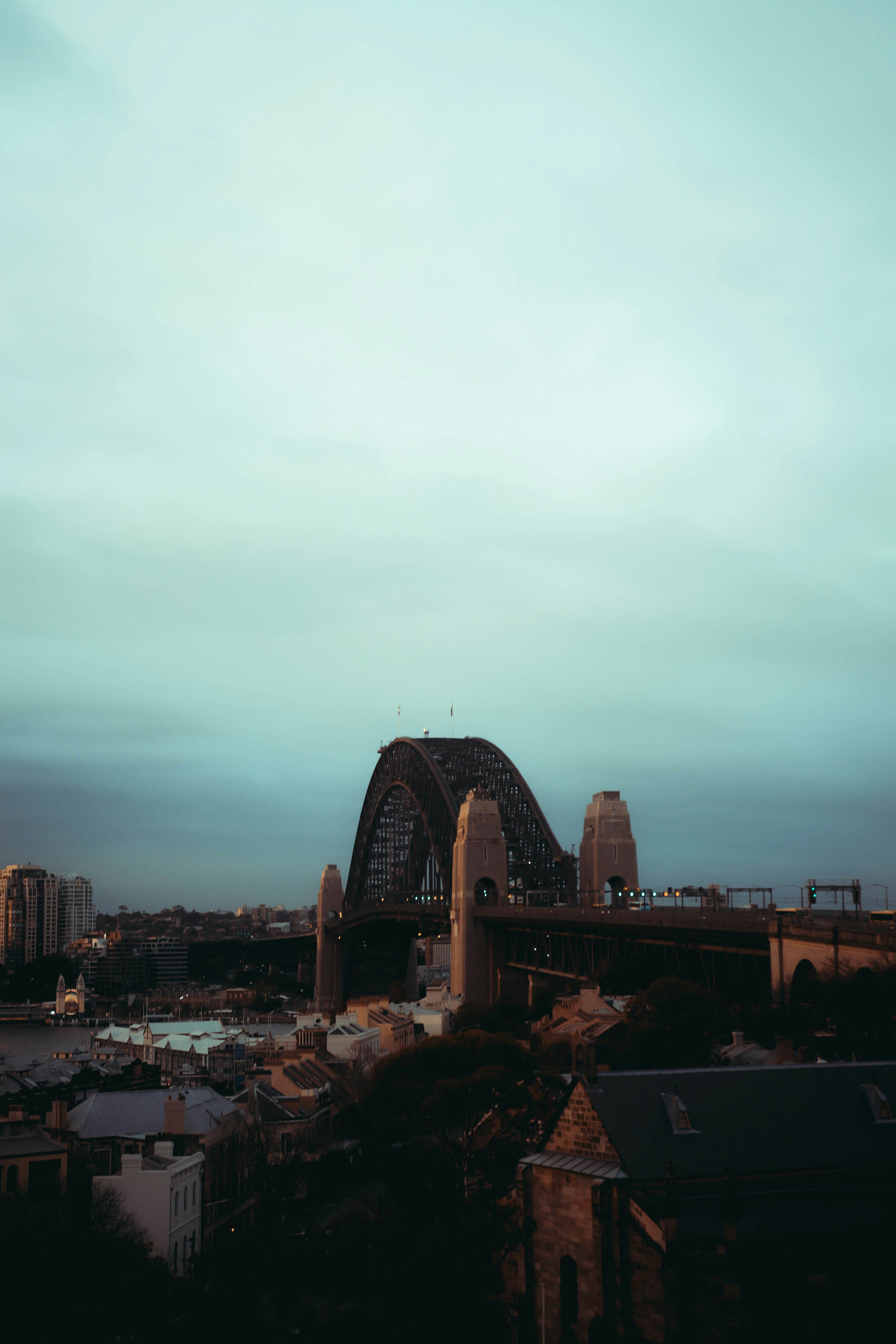 Harbor Arch at Dusk: A Quiet Sky Over the City