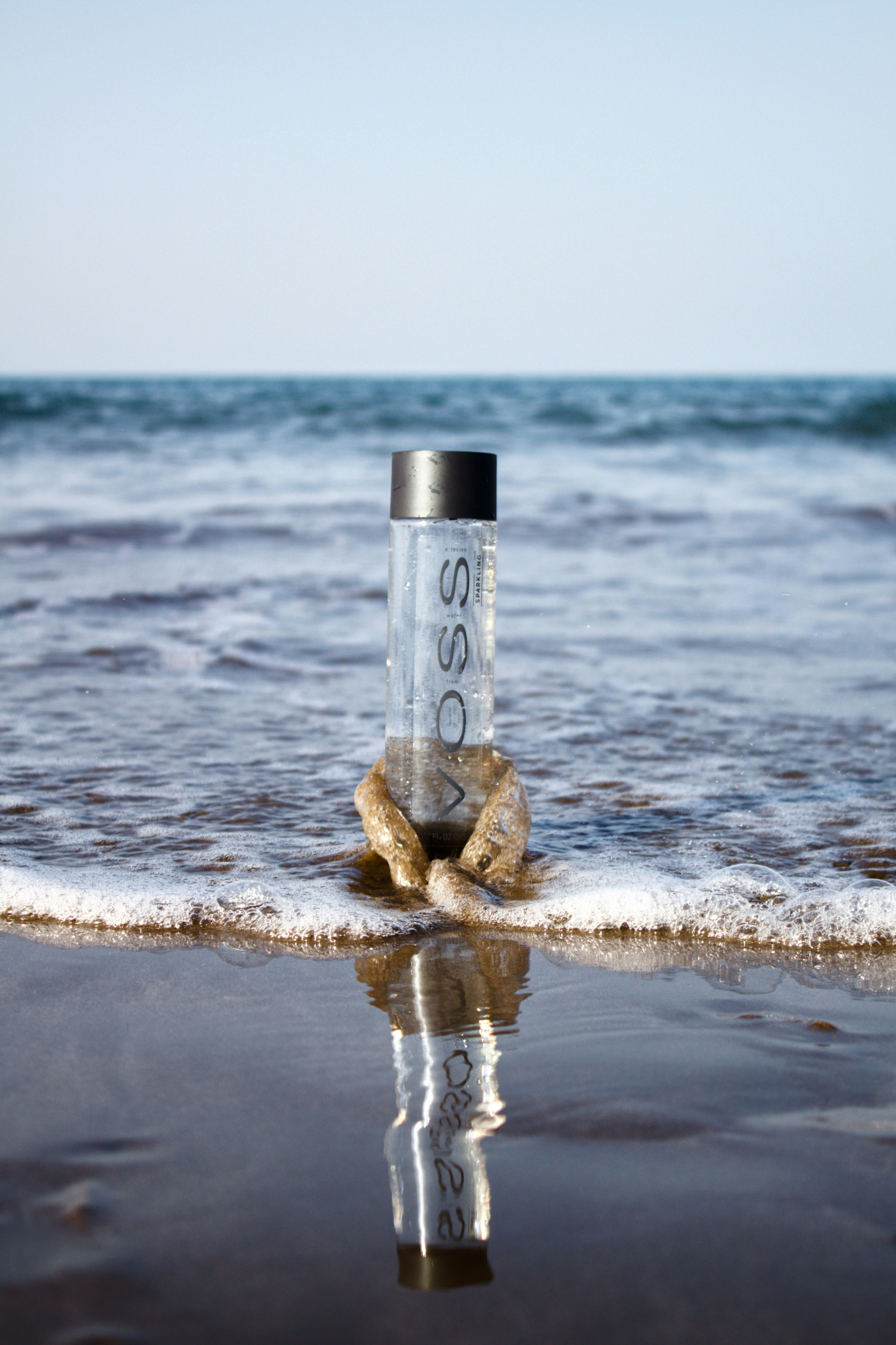 Boss Bottle Adrift at Tide's Edge