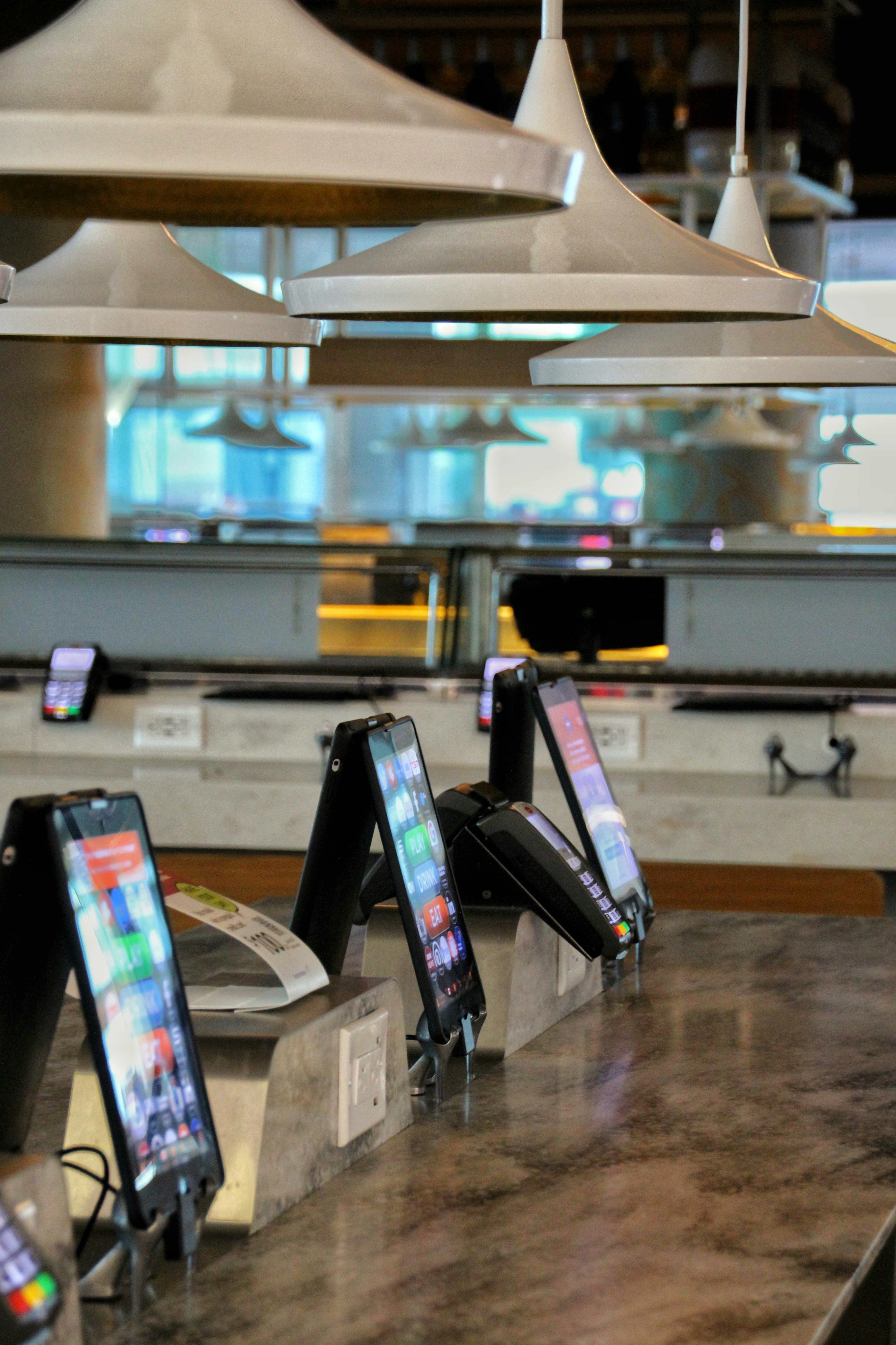 Checkout Row: A Quiet Haven of Touchscreen Stations in a Modern Café