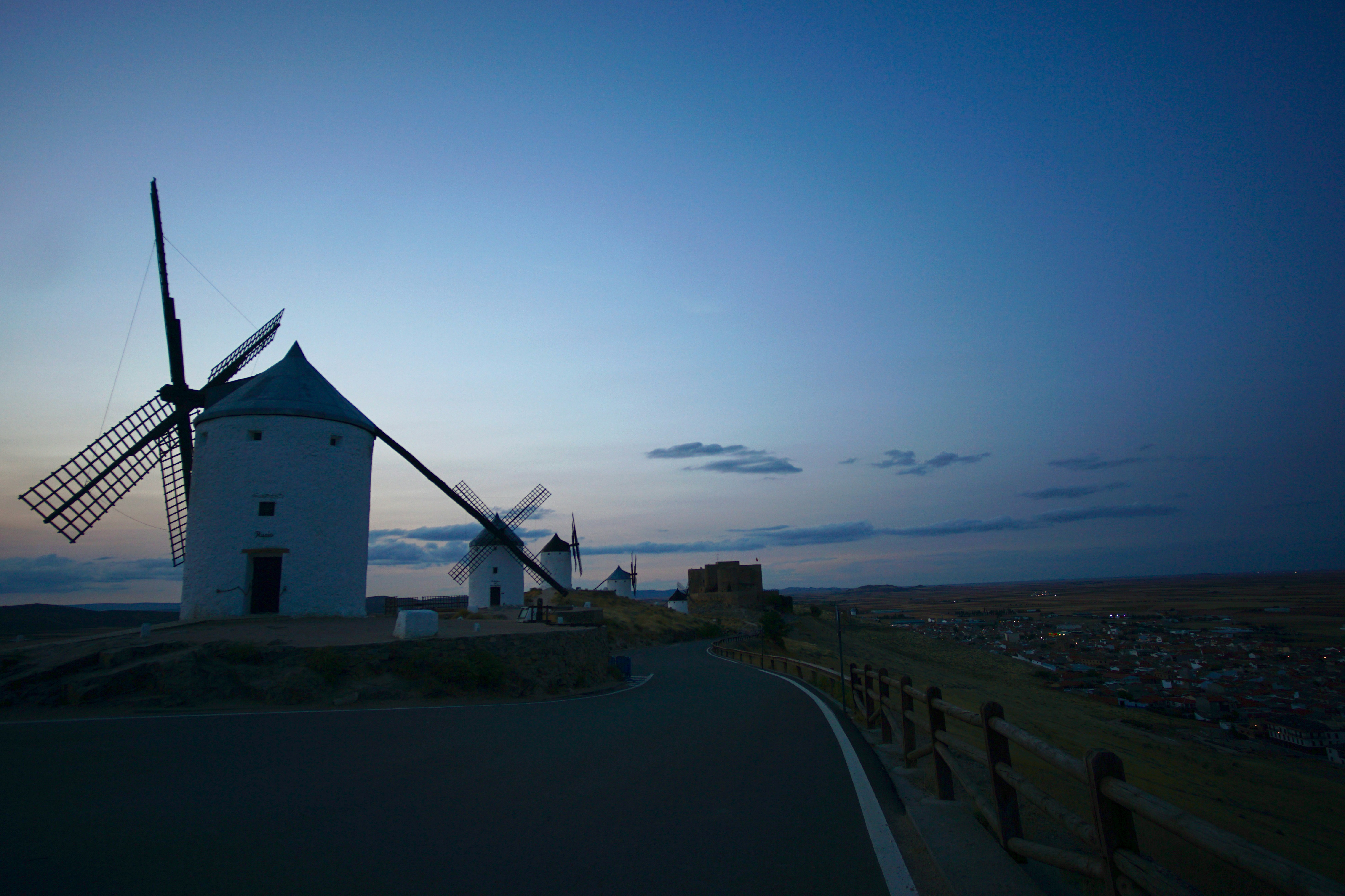 Windmills on the Dusk Crest: A Quiet Toll of the Plains