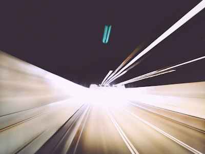 Convergence of Light: Subway Tunnel in Motion