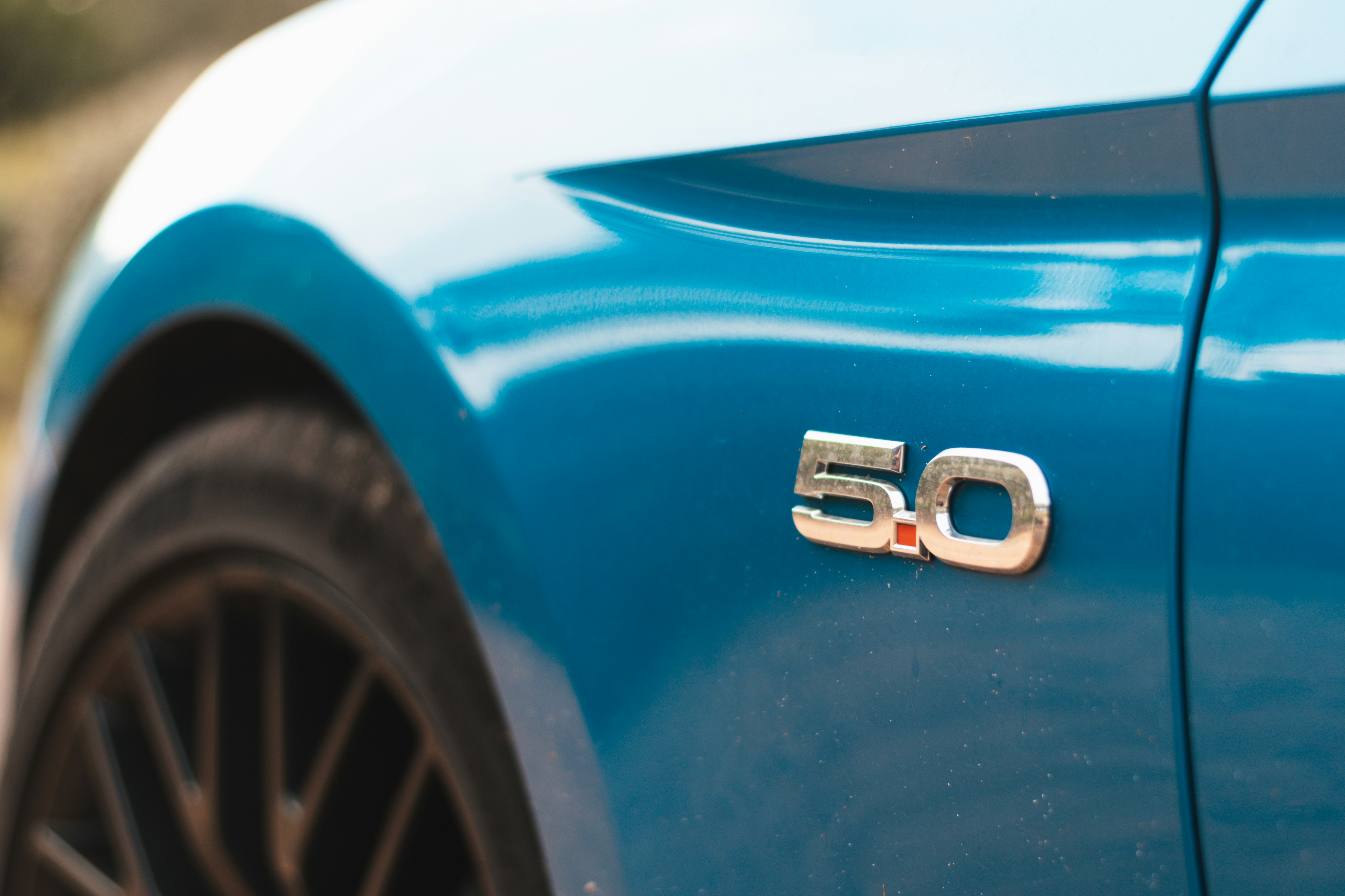 Blue and silver car with license plate photo – Free Blue Image on Unsplash