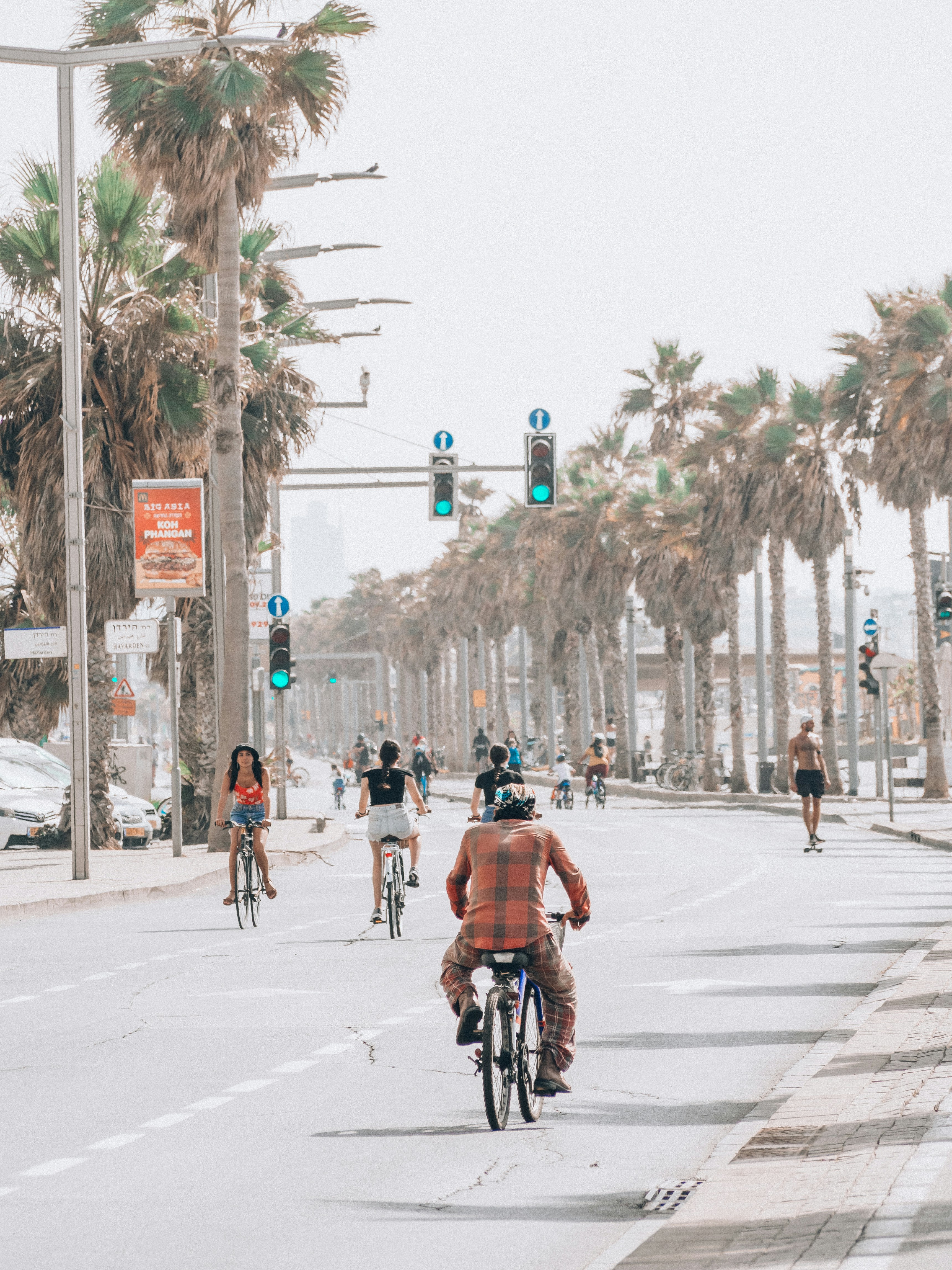 People riding bicycle on road during daytime photo – Free Israel Image ...