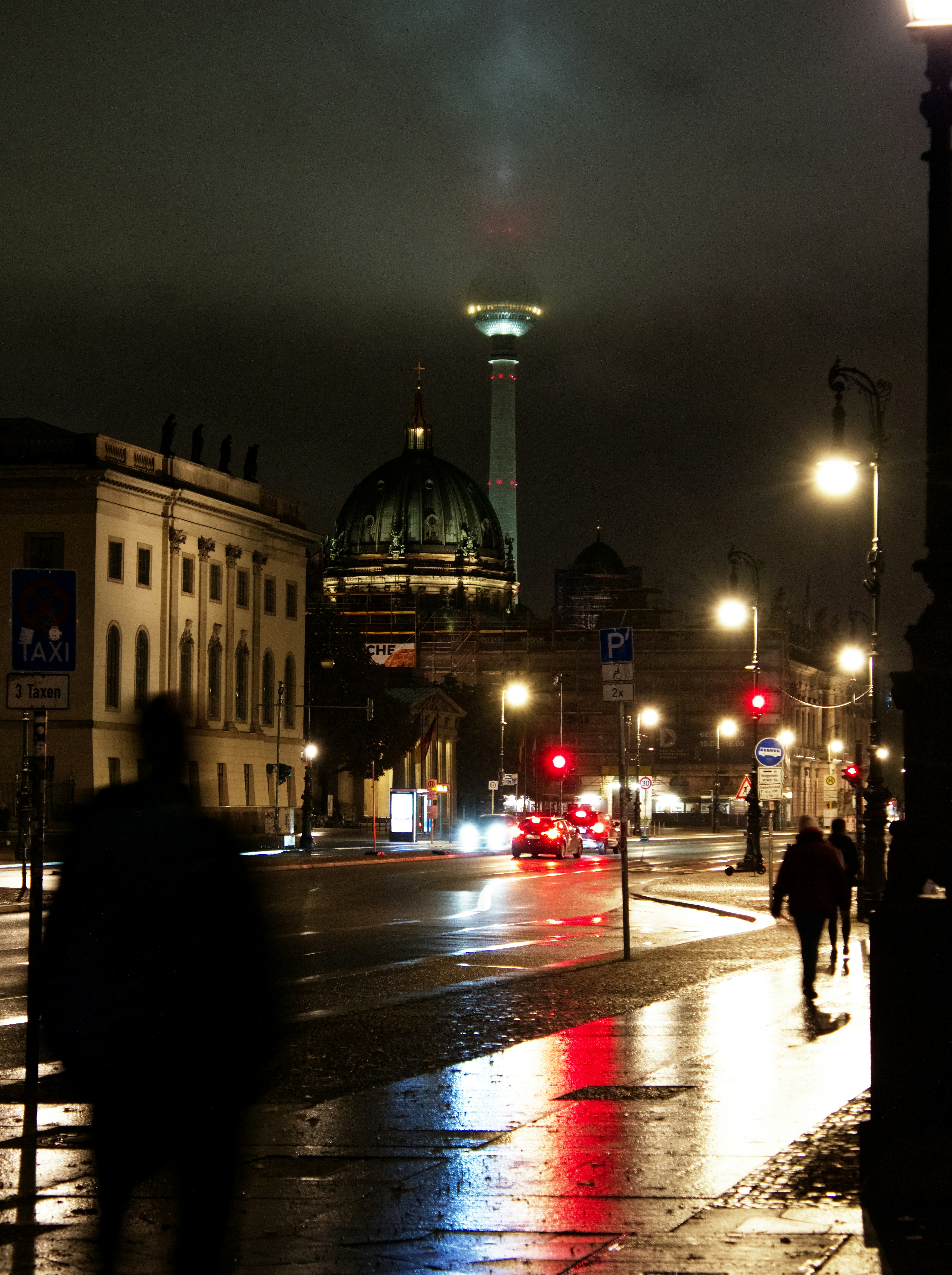 Midnight Boulevard: City Lights Reflect on Wet Stone