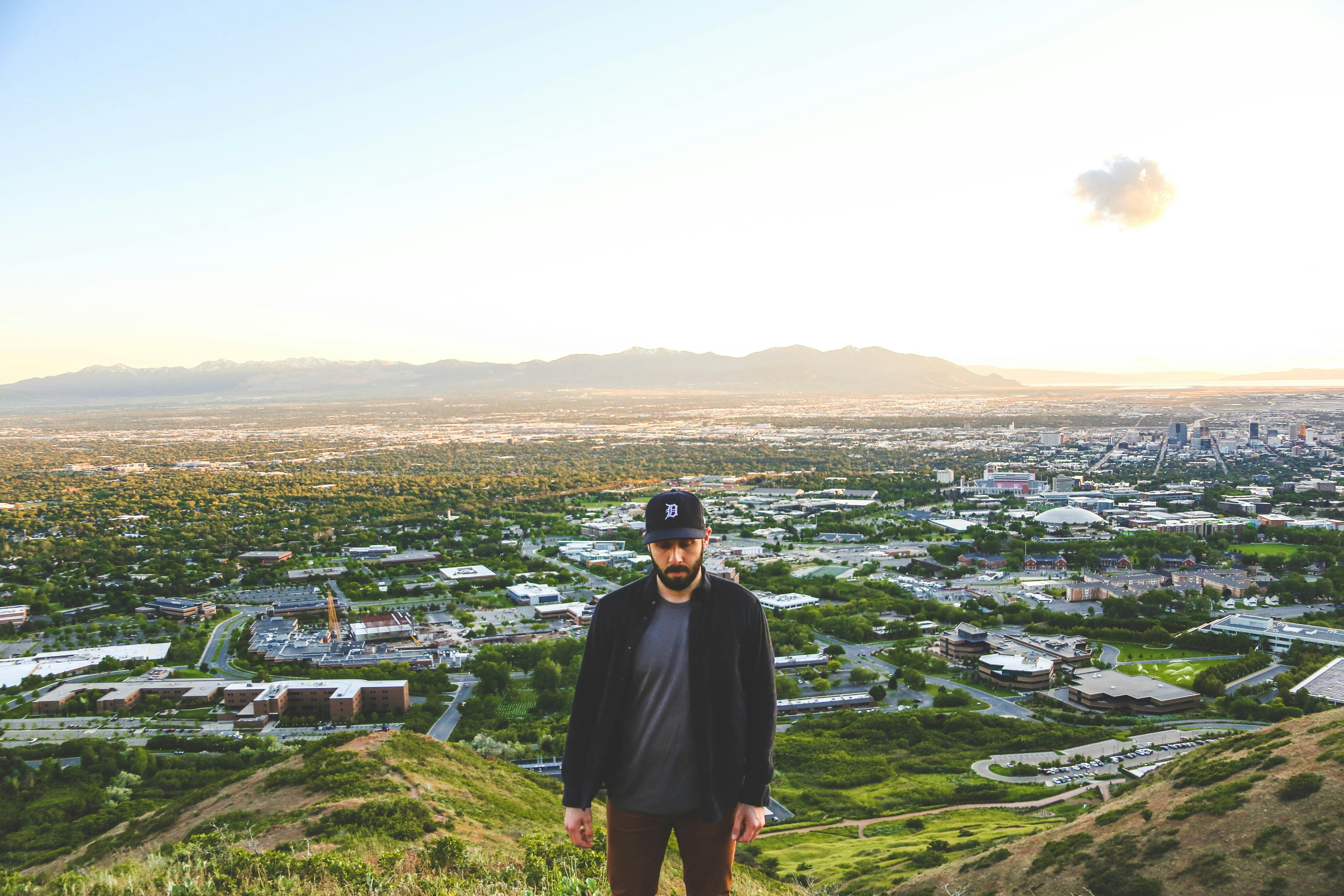 Golden Hour Overlook: A Lone Figure Framing the Valley Below