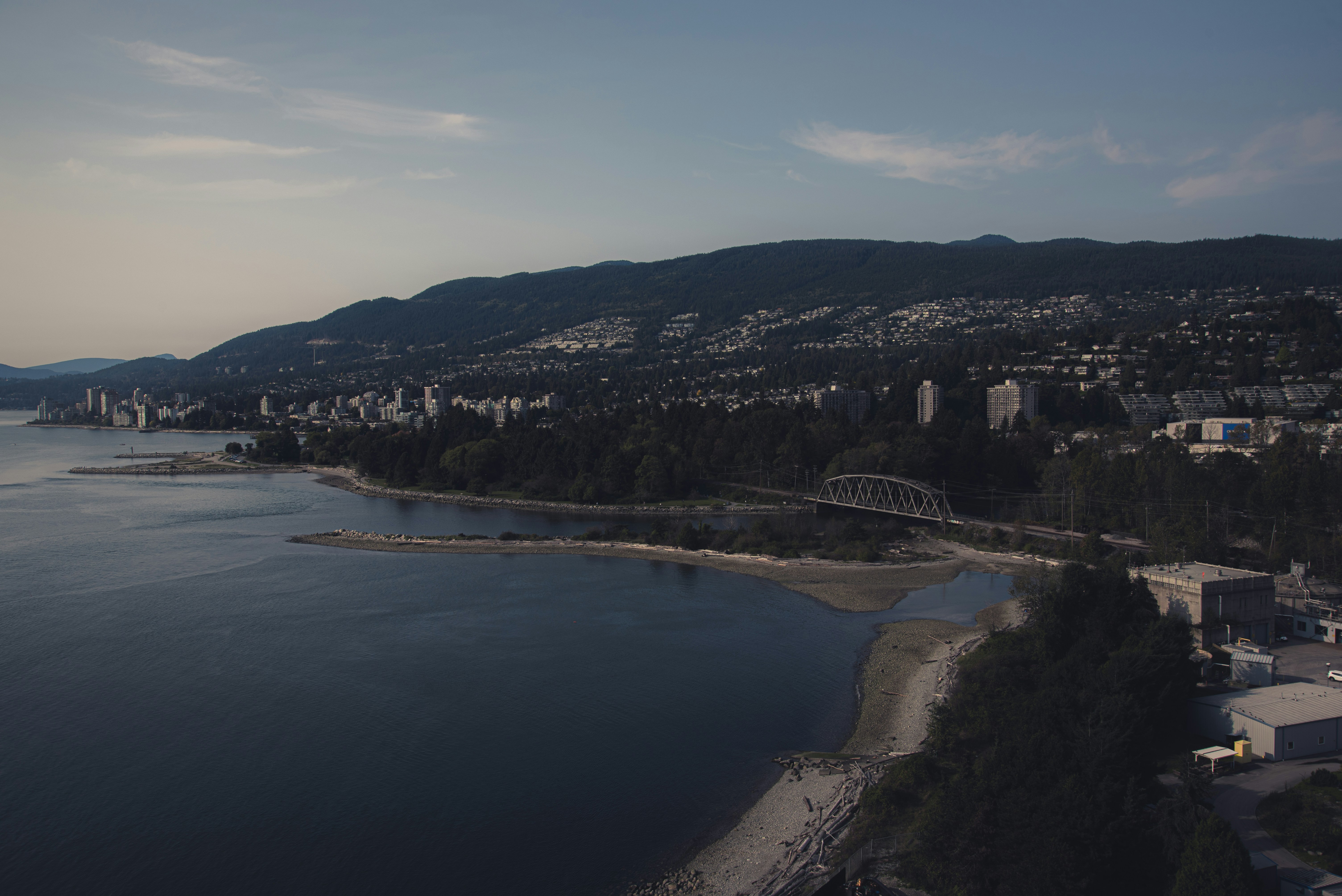 Arc Bridge Framing a Quiet Coastal City