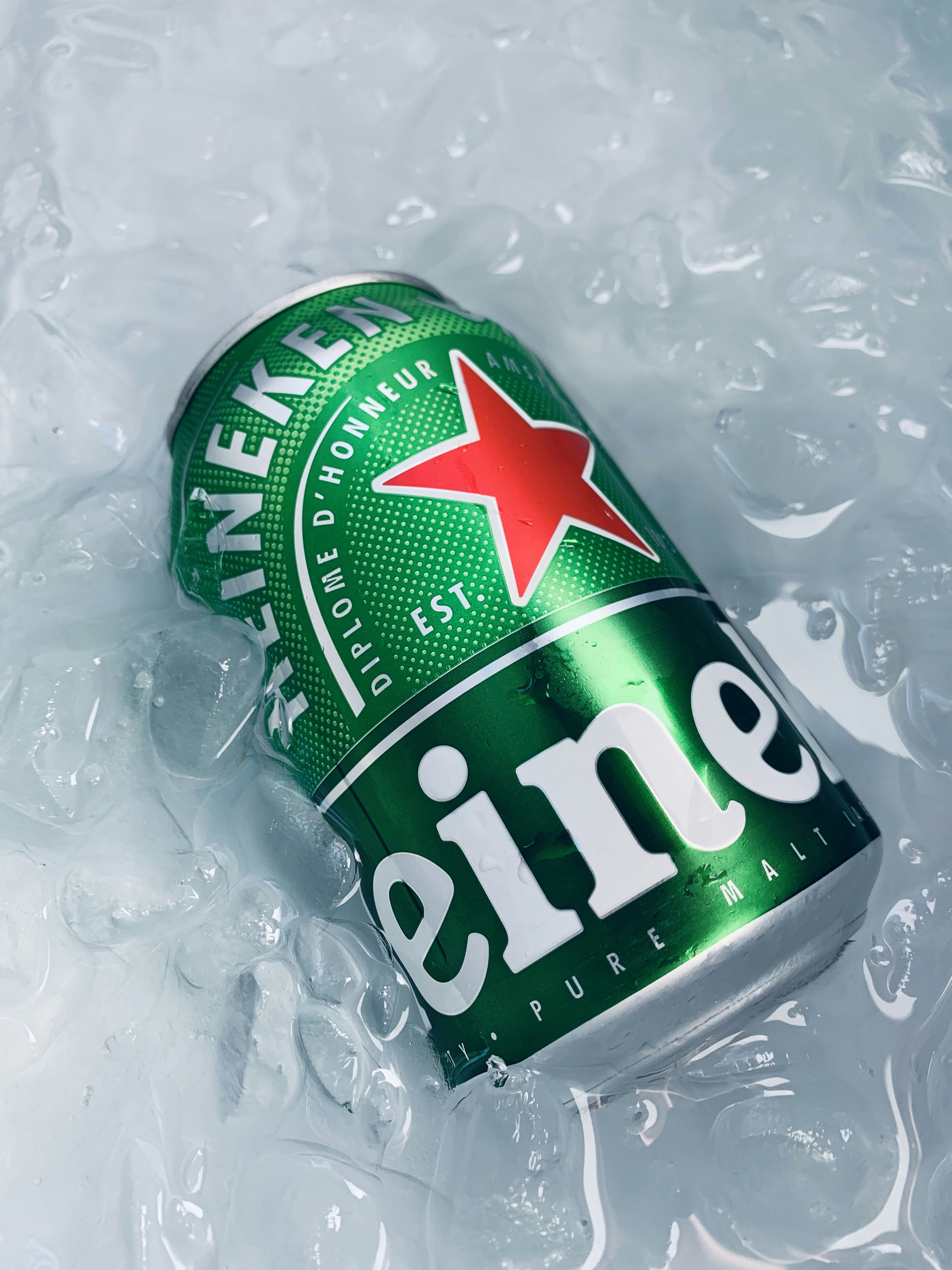 Neon-green Heineken Enshrined in Ice Crystals