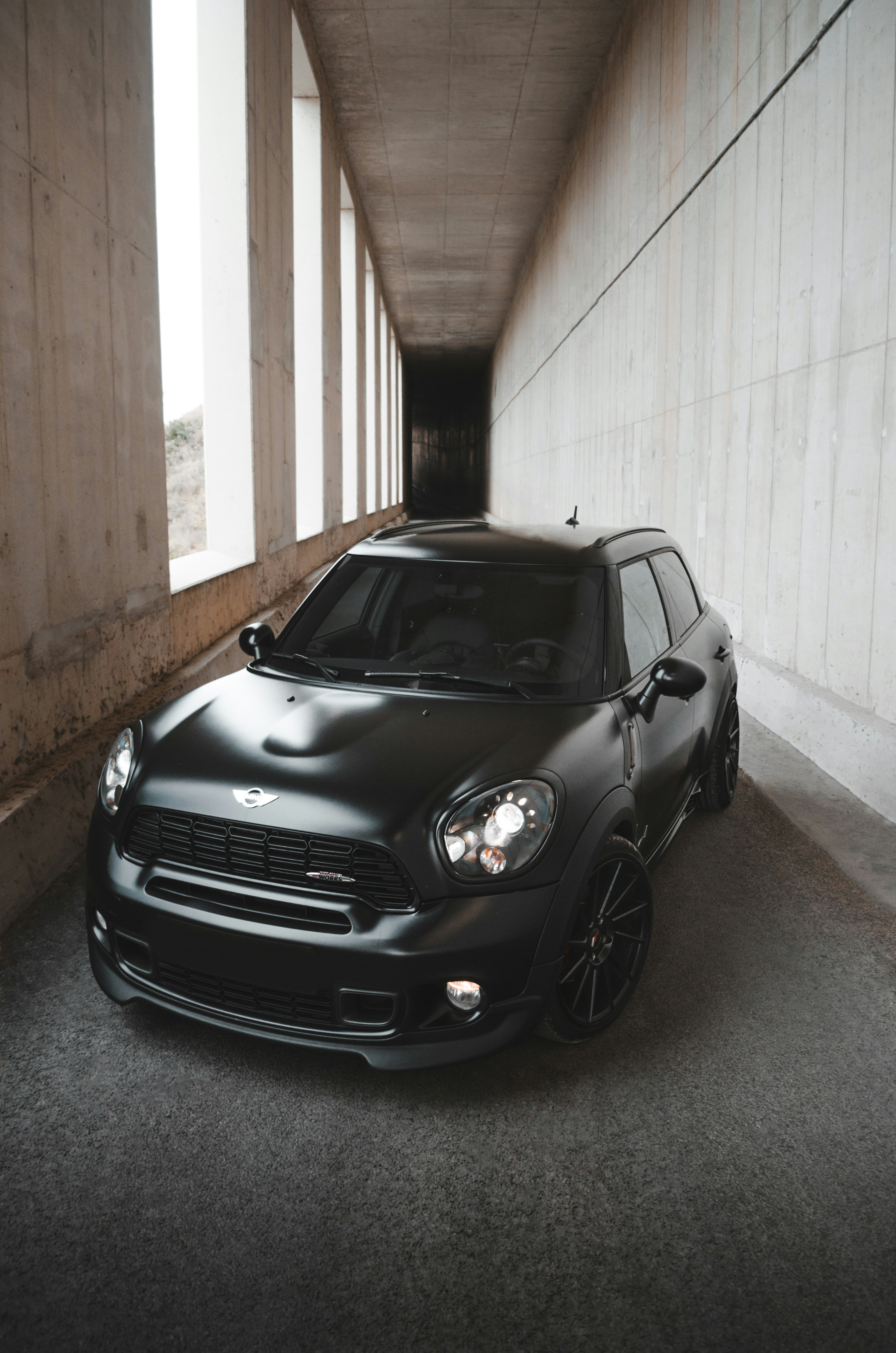 Midnight Matte Mini in a Quiet Concrete Tunnel