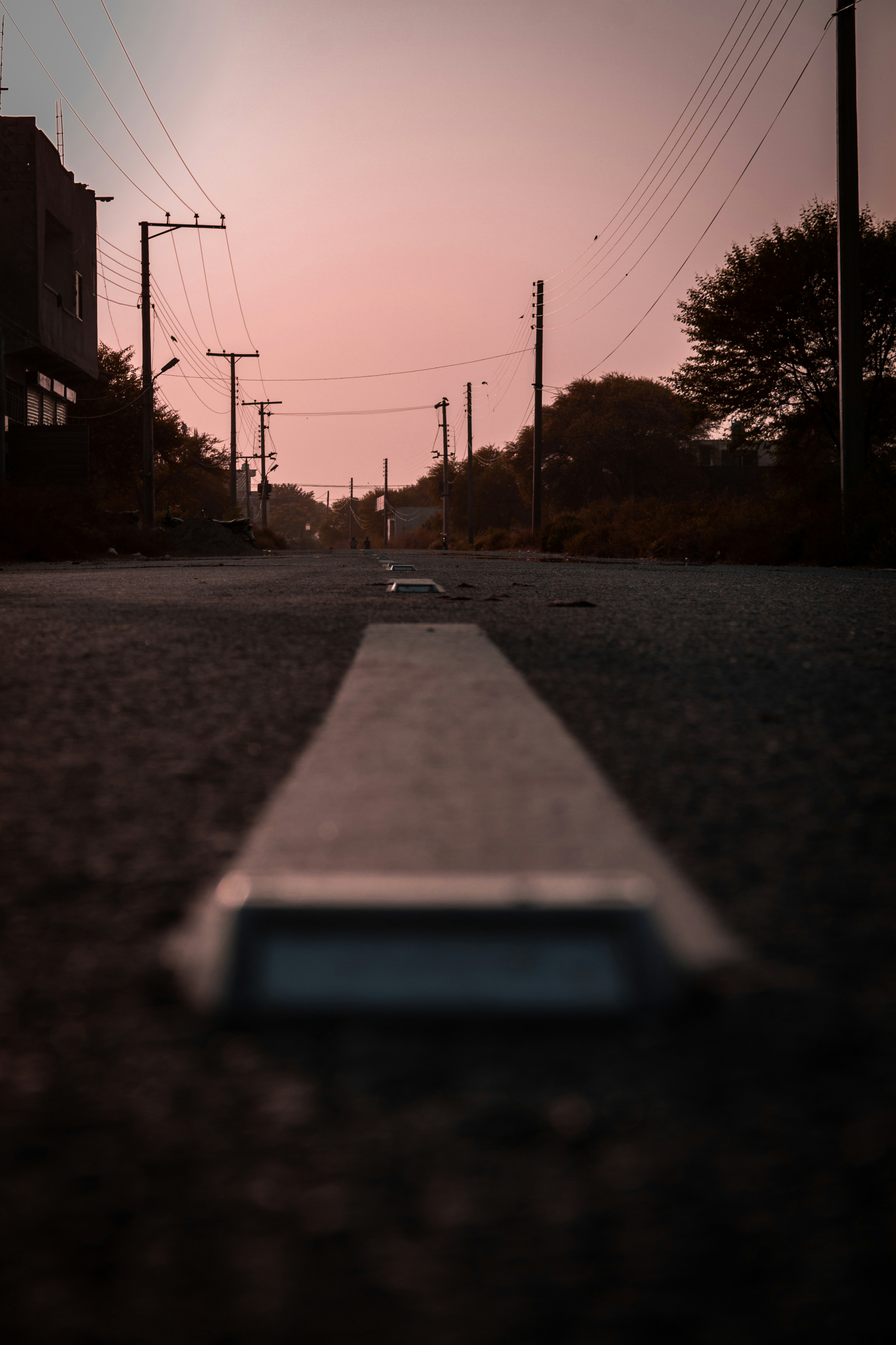 gray concrete road during sunset