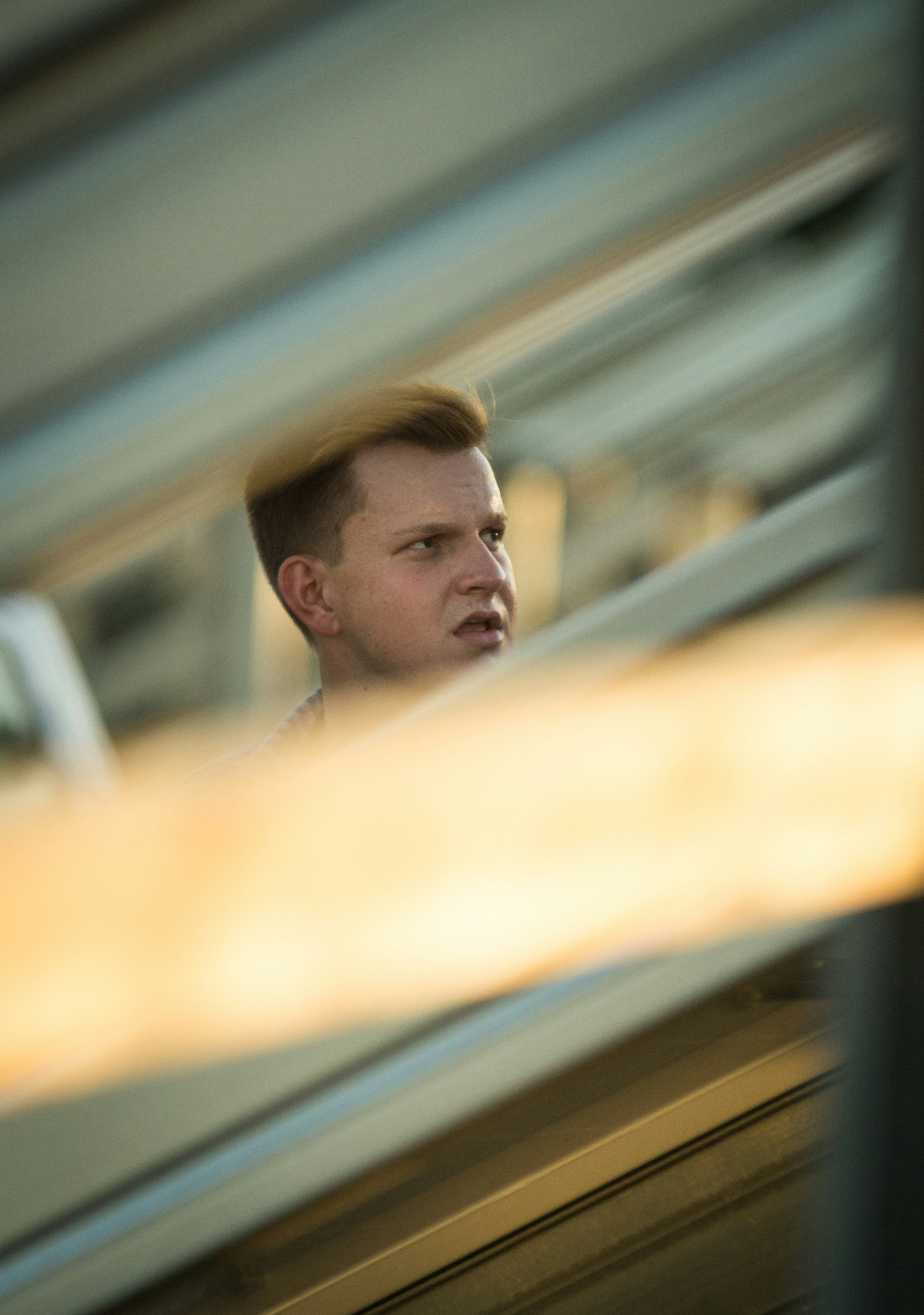 Muted Focus: A Portrait Through Slats