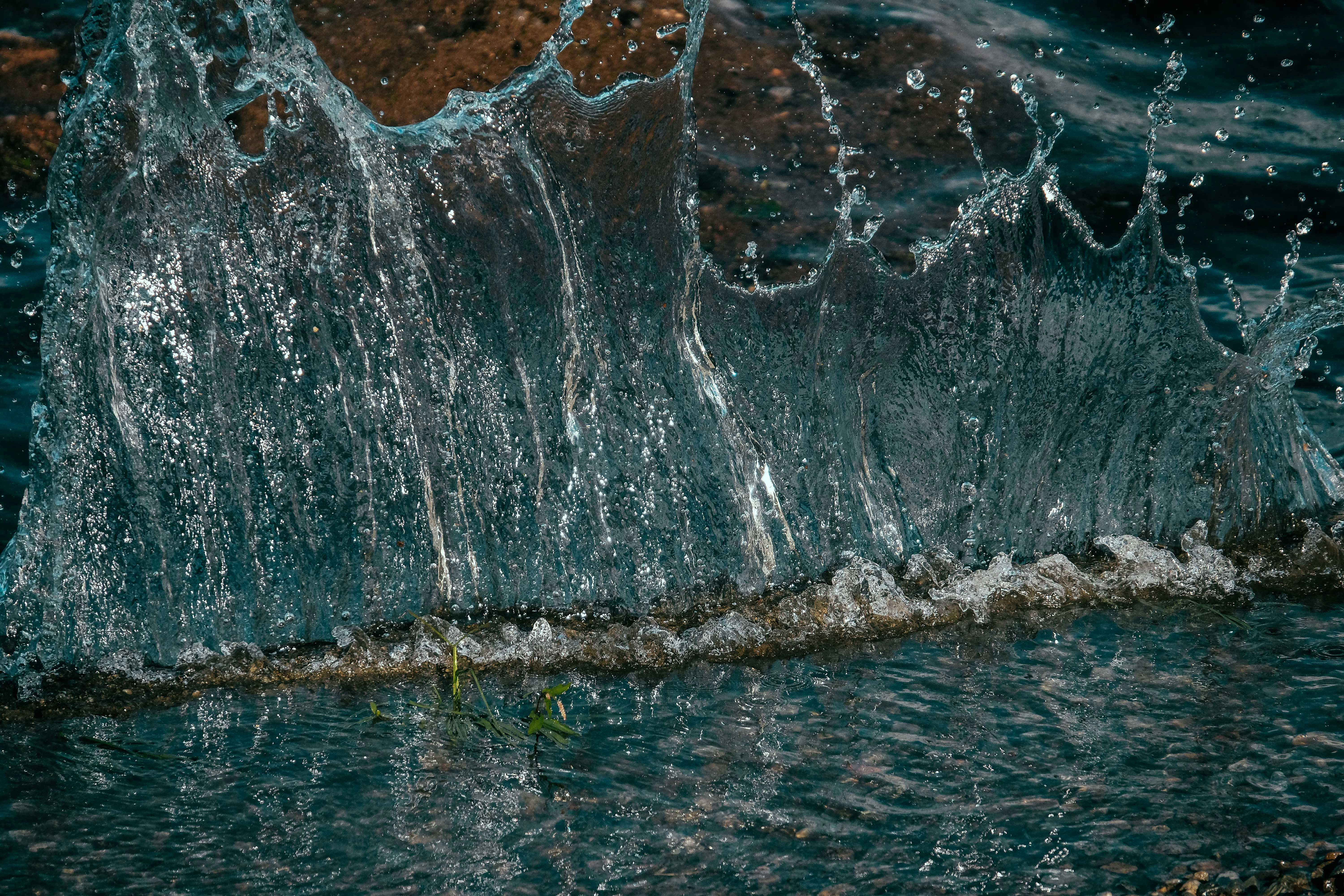Water splash on body of water photo – Free Snow Image on Unsplash
