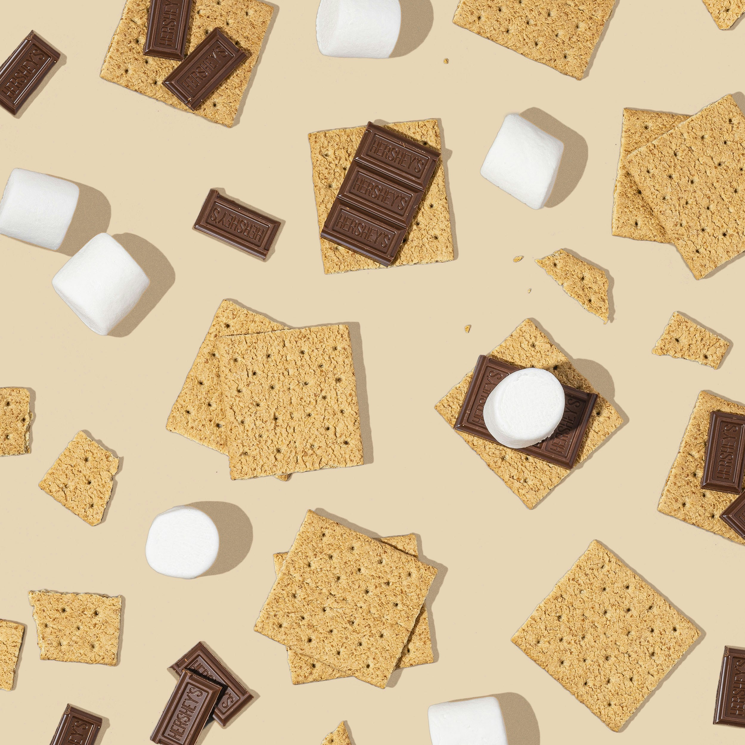 Cracker Mosaic: Chocolate Squares and Marshmallows on a Cream Surface