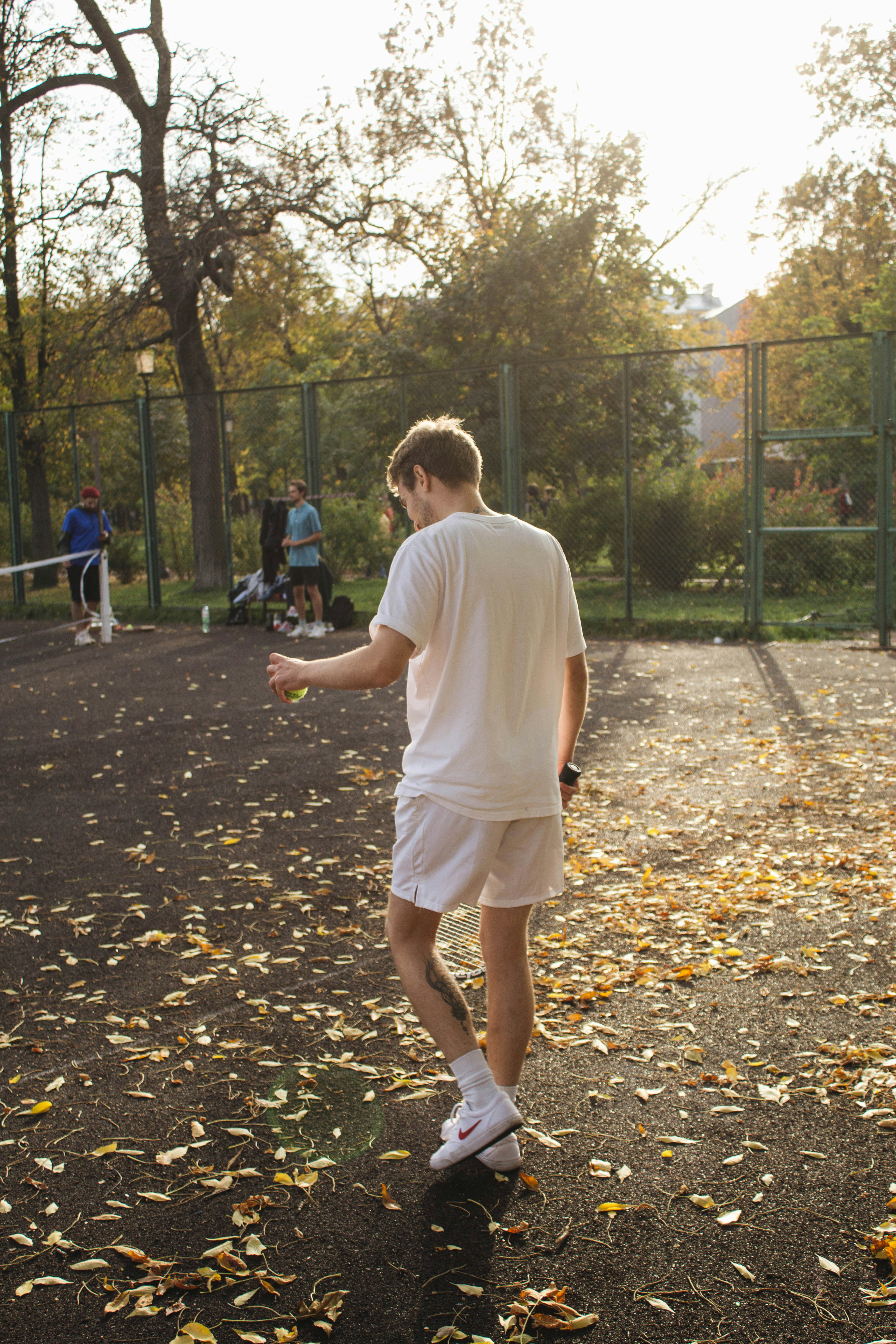 Amber Hour Park Moment: White-tee Skater in Autumn Light
