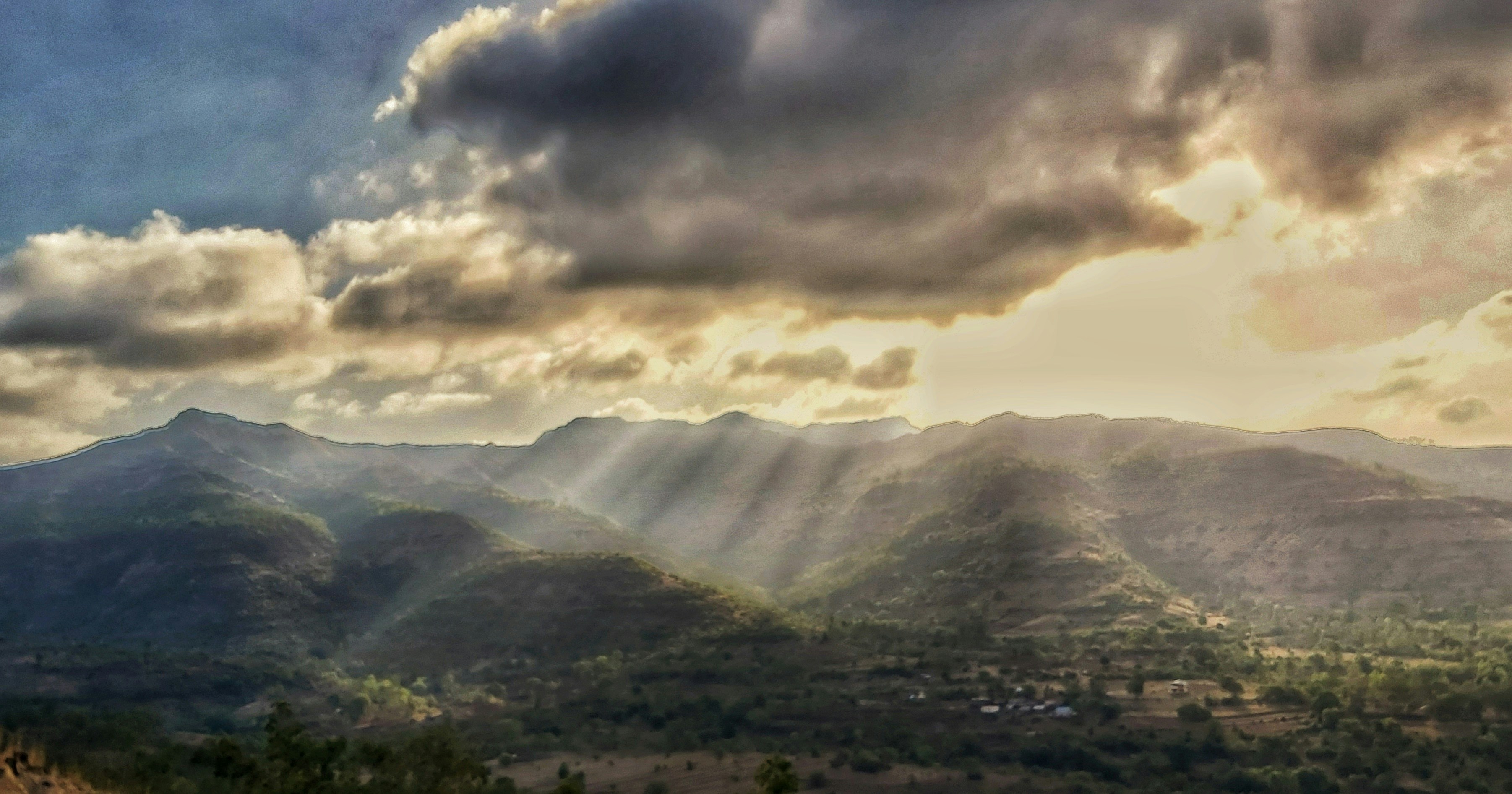 Sunlit Valleys and Cloudy Peaks