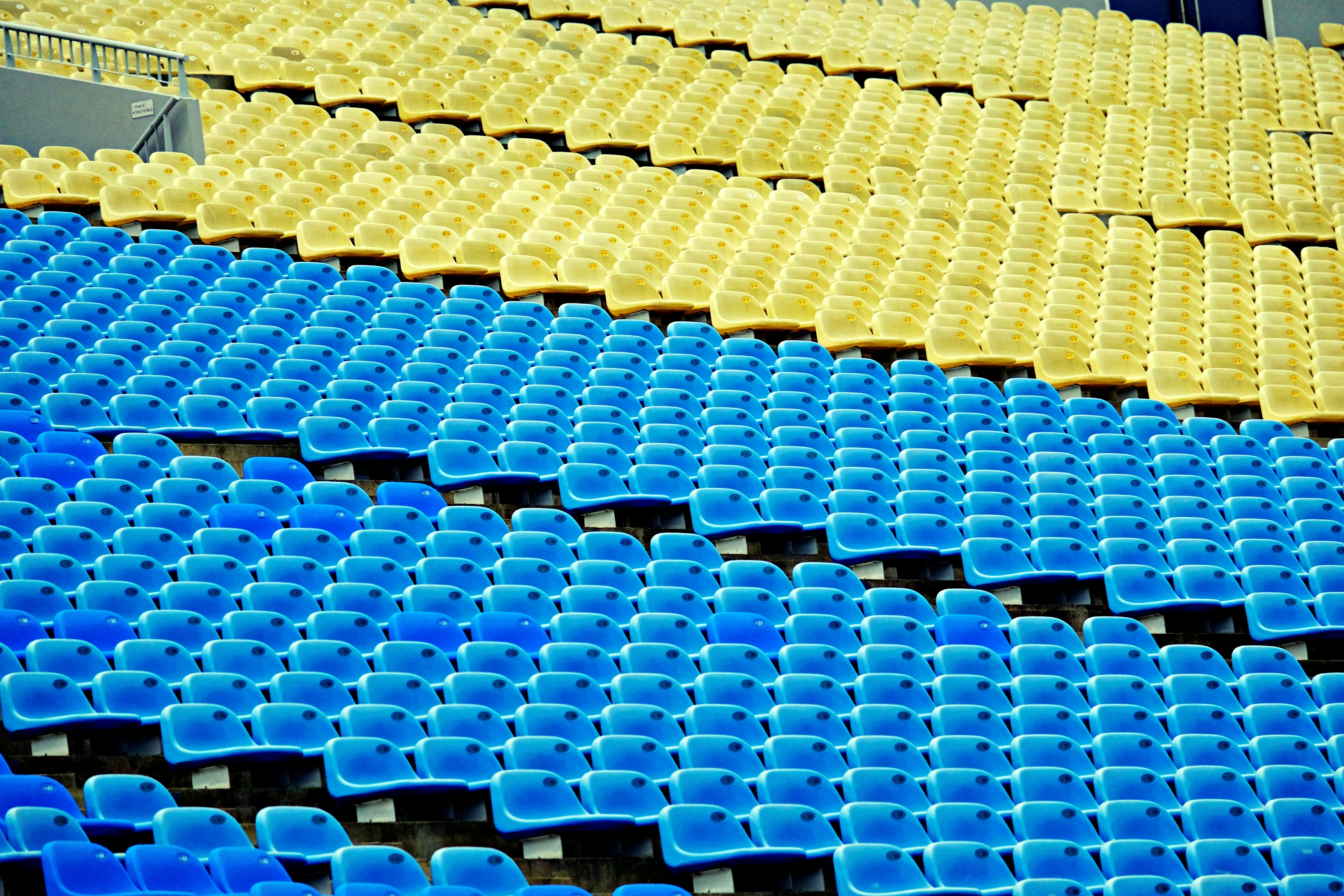 Seat | blue and white chairs on field during daytime