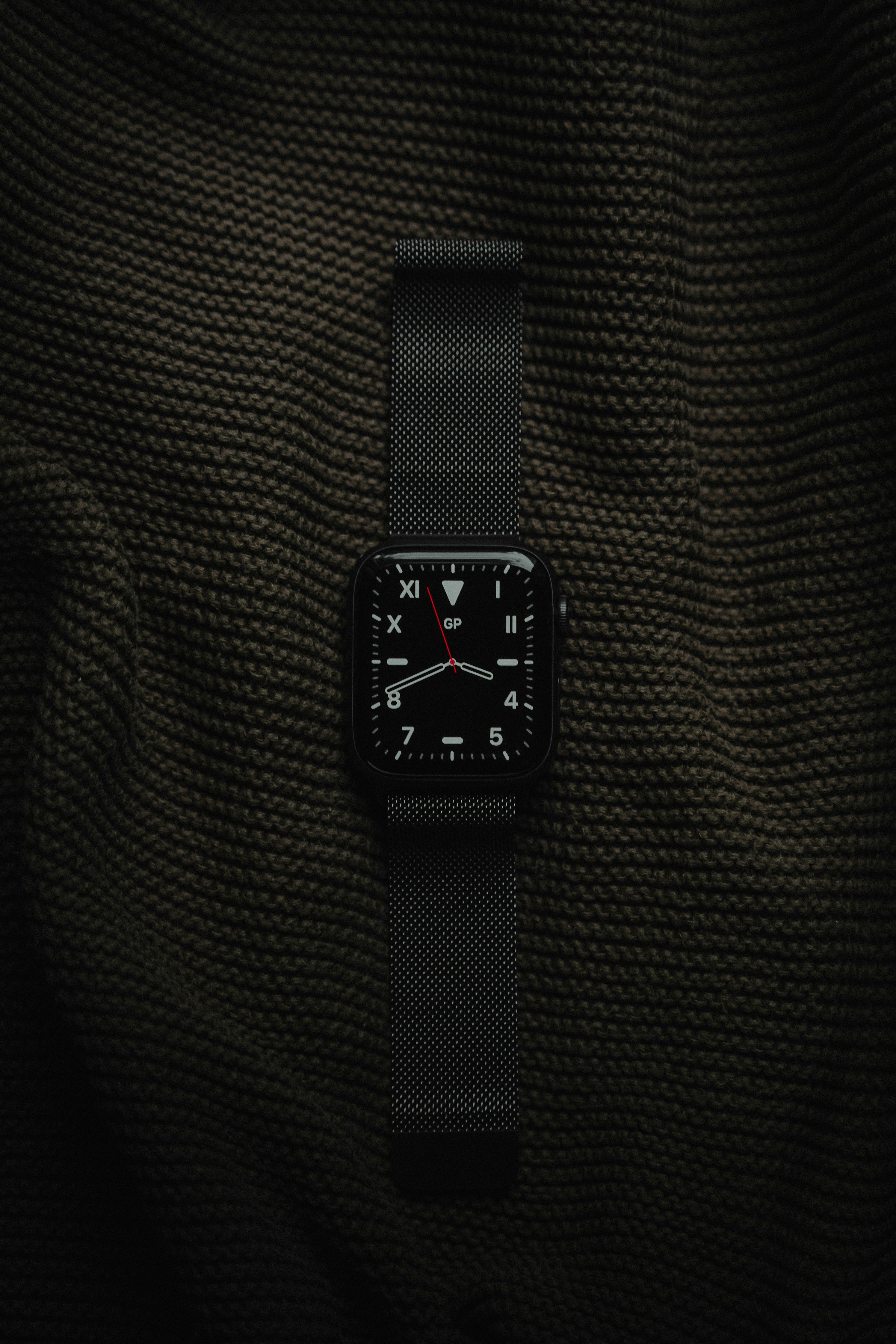 black and silver analog watch