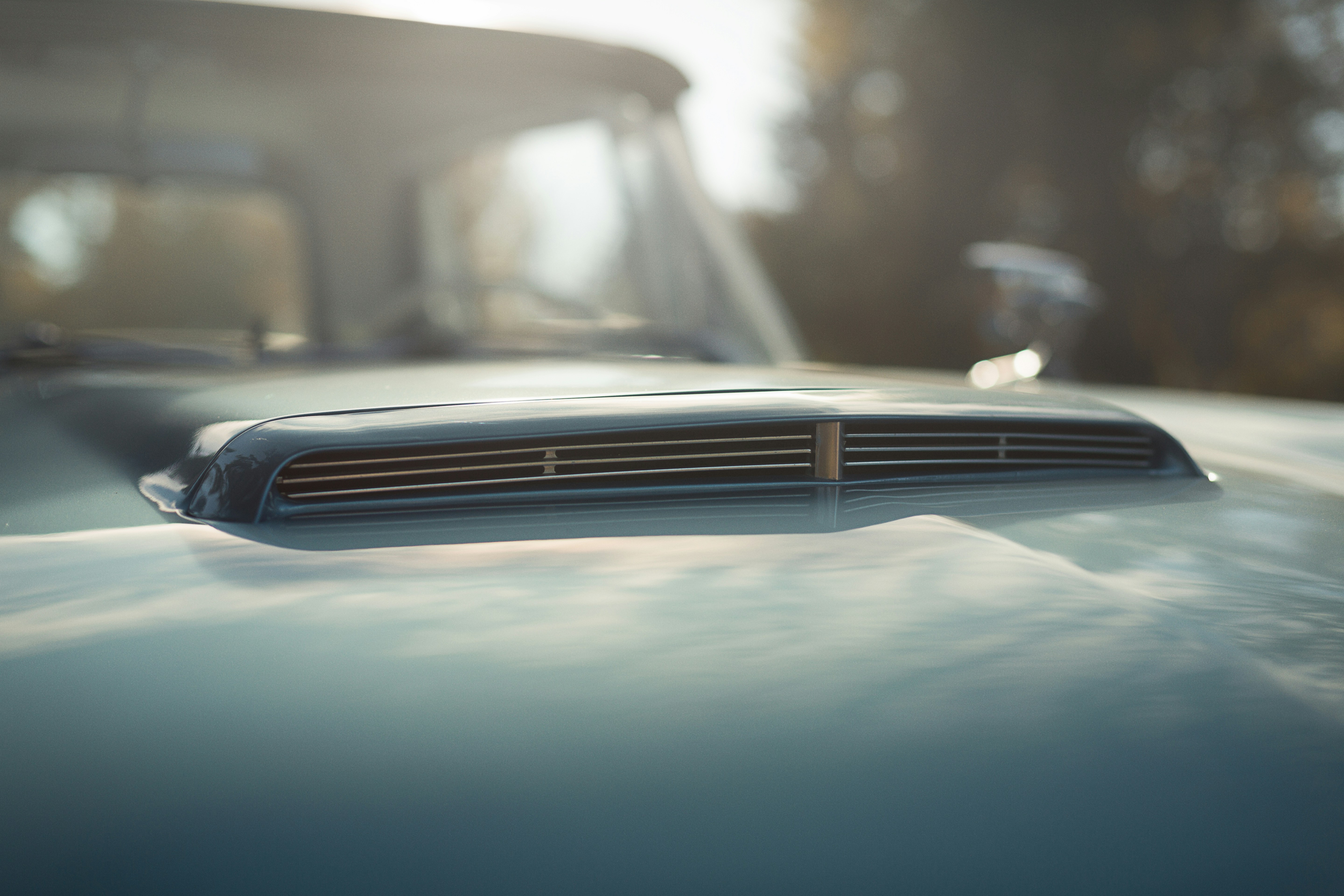 Blue Hood Scoop in Soft Focus: a Quiet Classic Car Close-Up