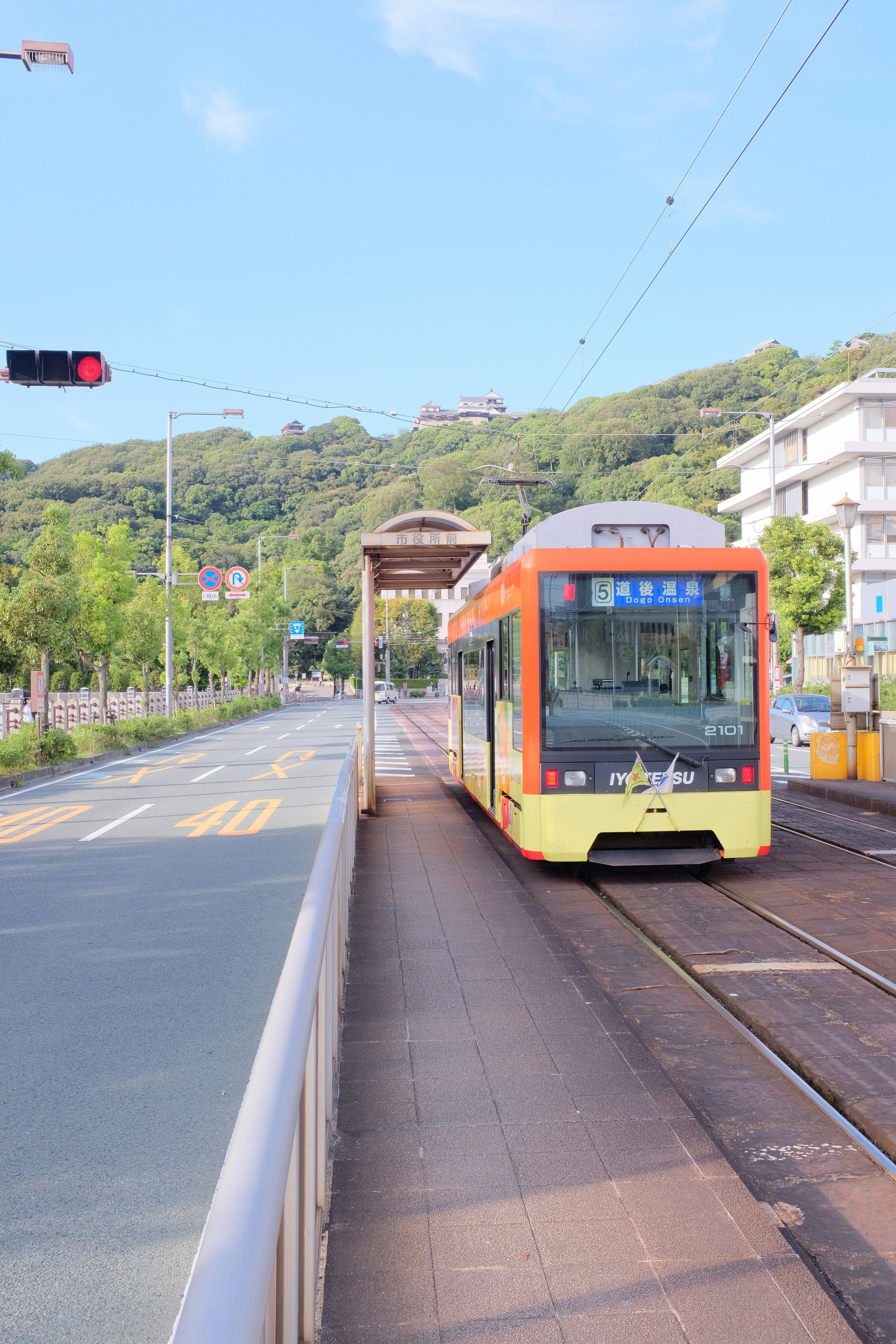 Urban Transit Harmony: A Tram's Journey Through Nature