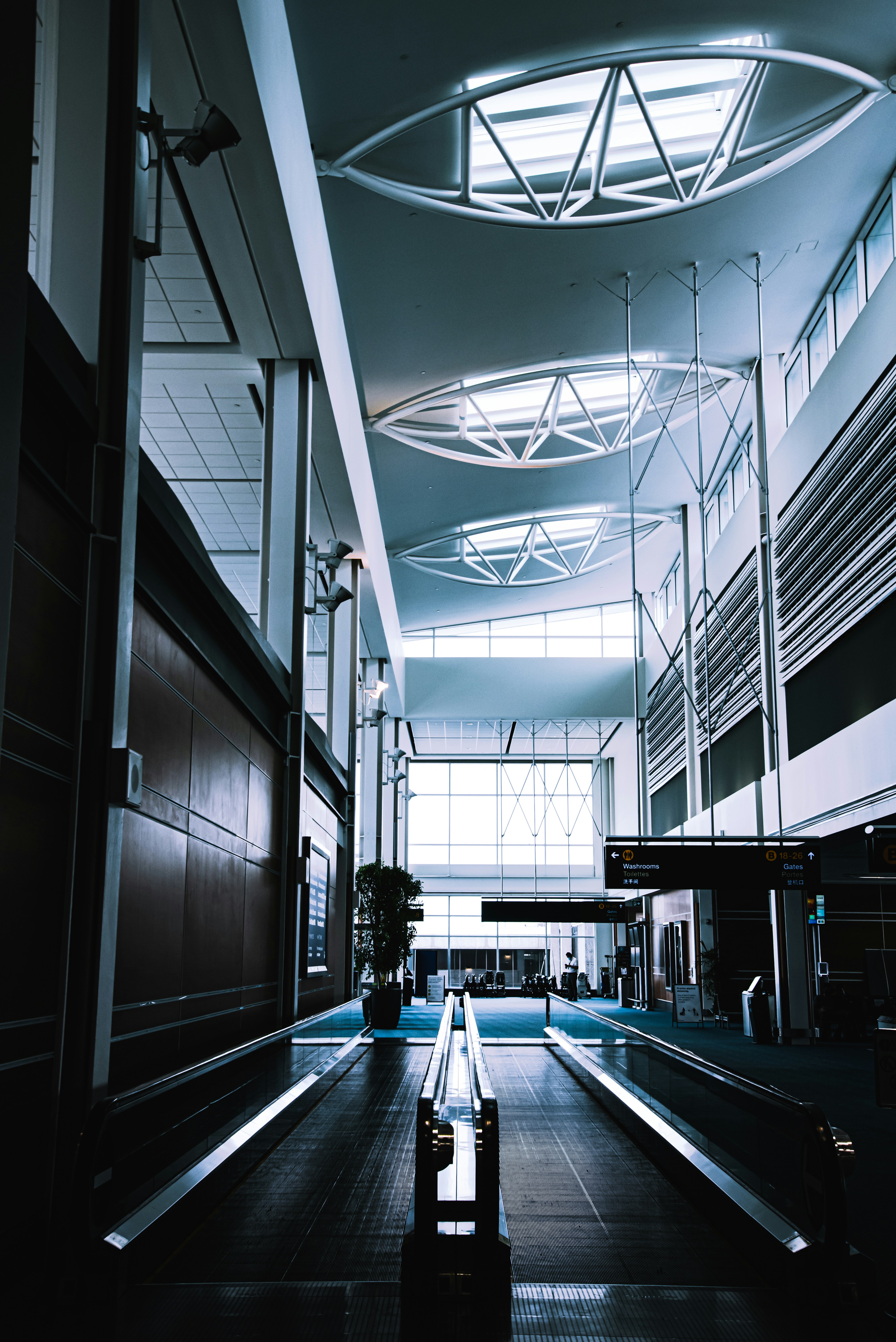 Vanishing Point in a Modern Transit Hall: Blue Steel and Glass