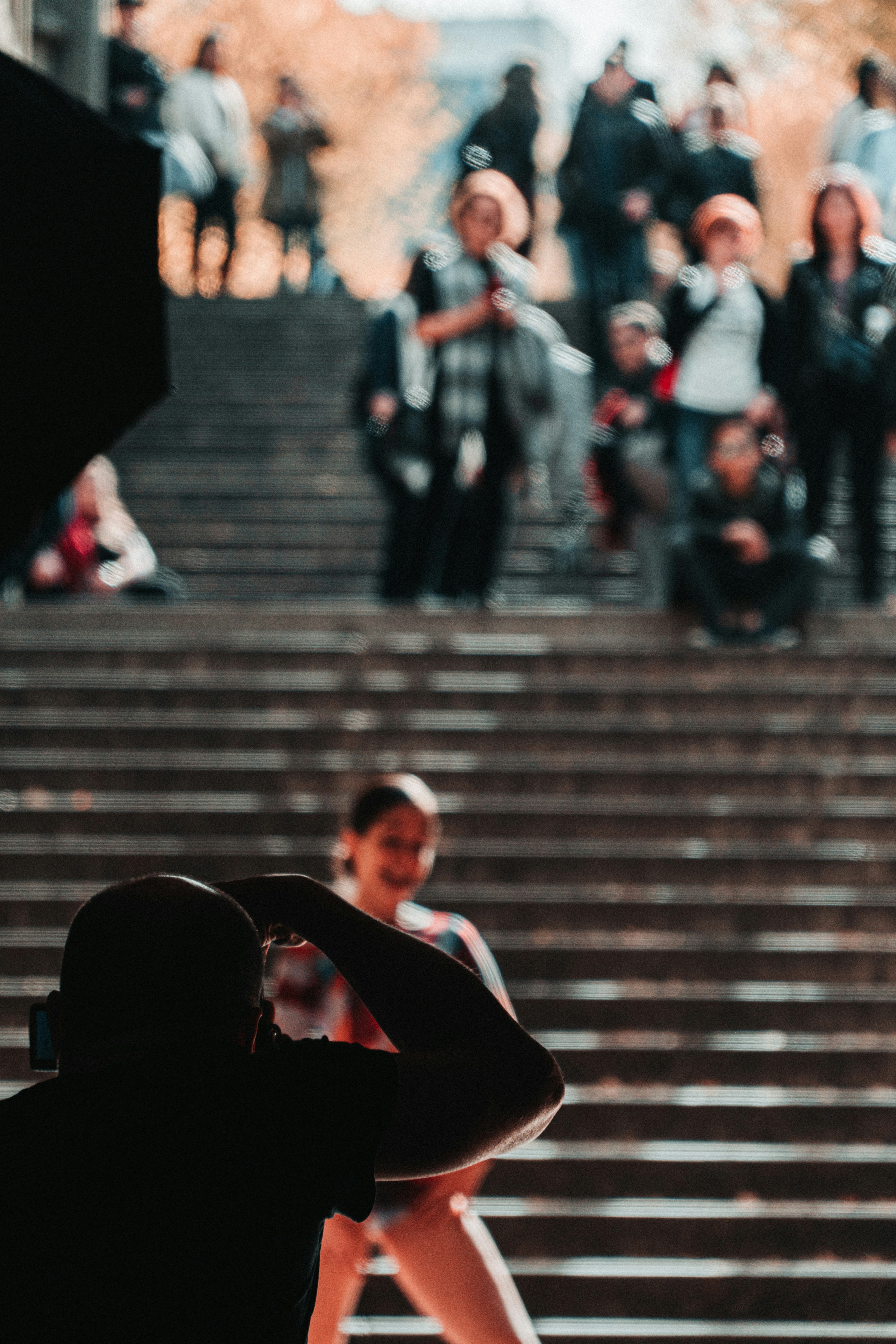 Staircase Moment: A Street Photographer Frames a Radiant Smile
