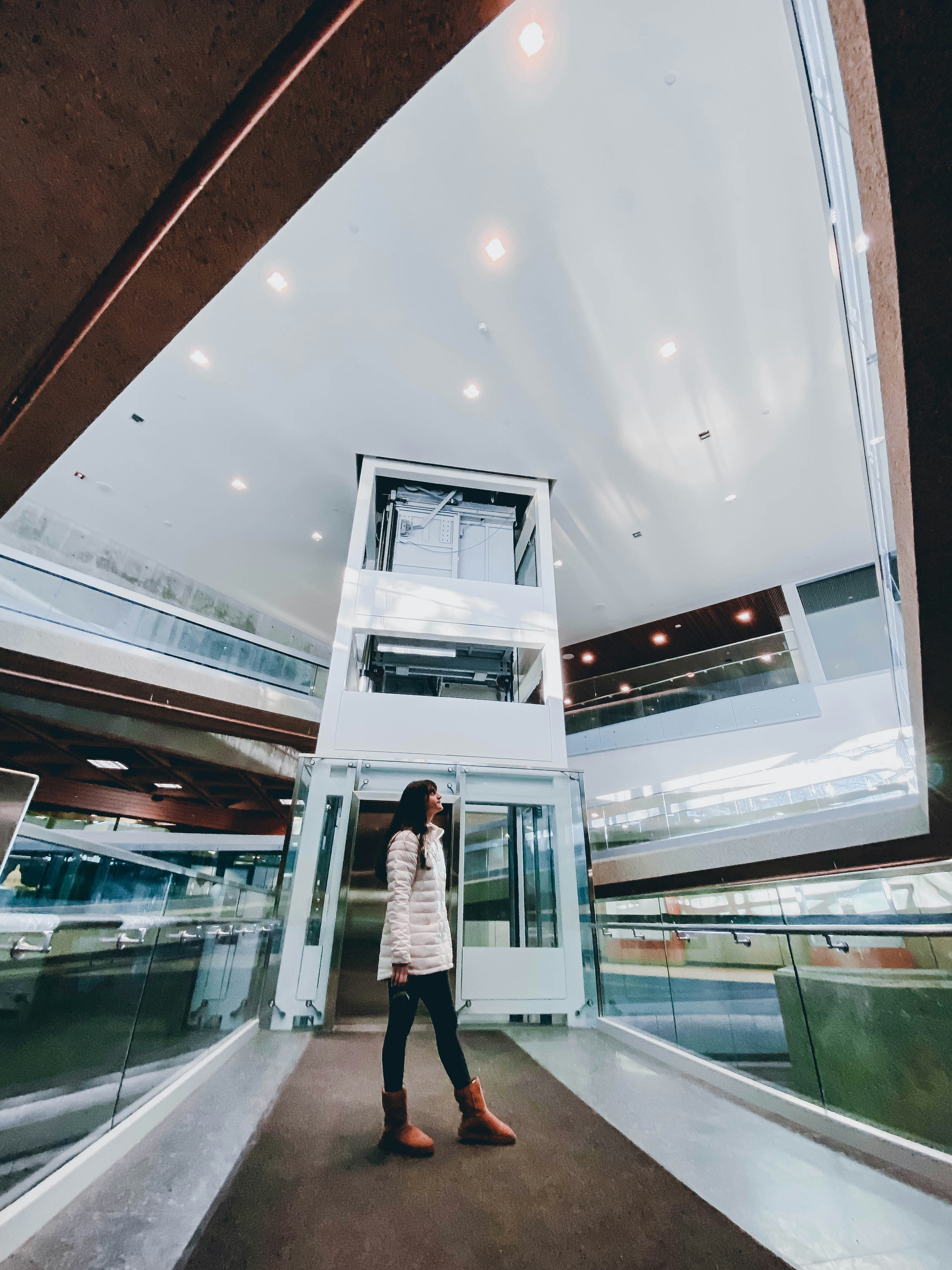 Vertical Glass Cathedral: A Quiet Pause in a Modern Atrium