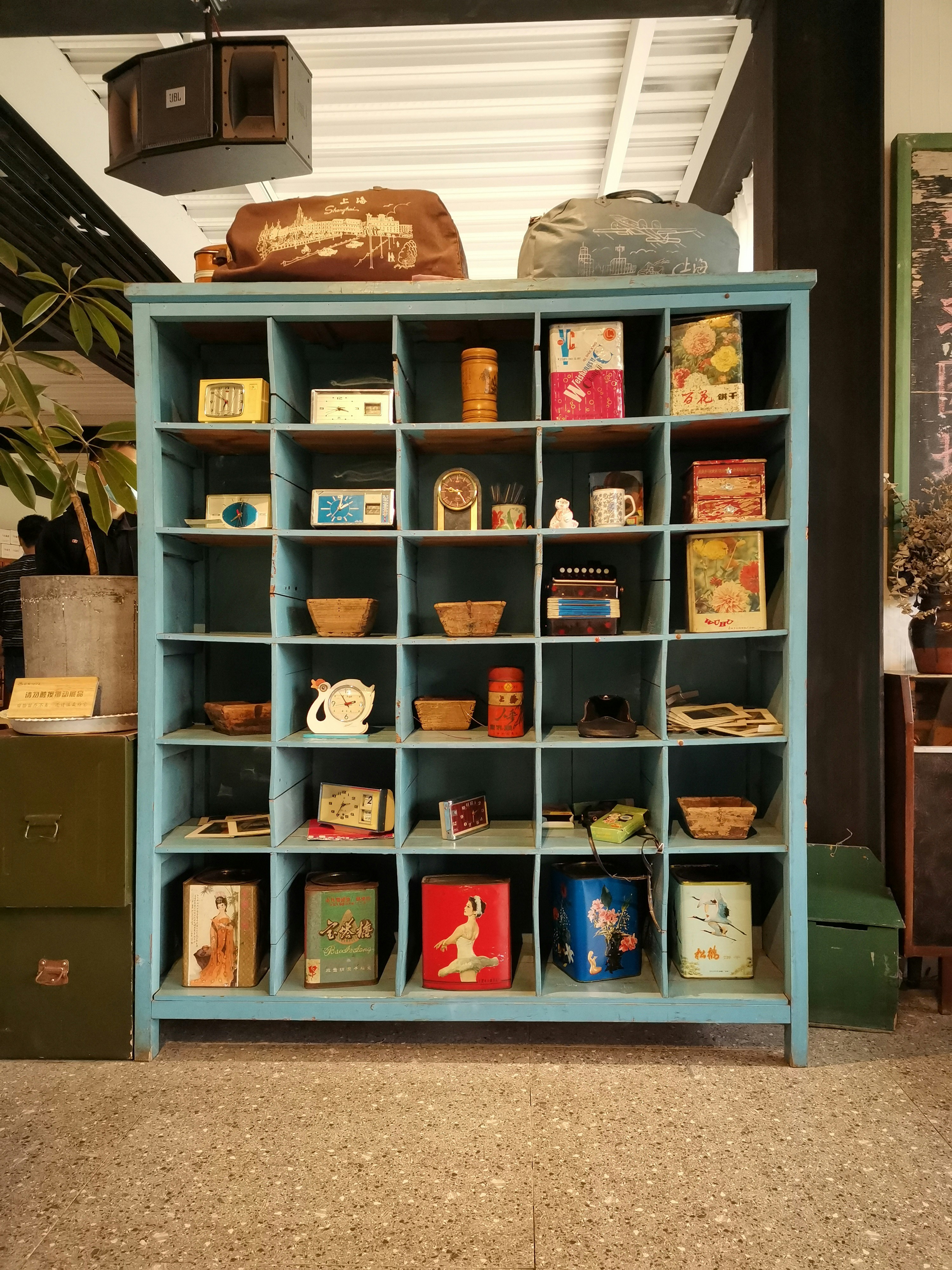 brown wooden shelf with assorted items