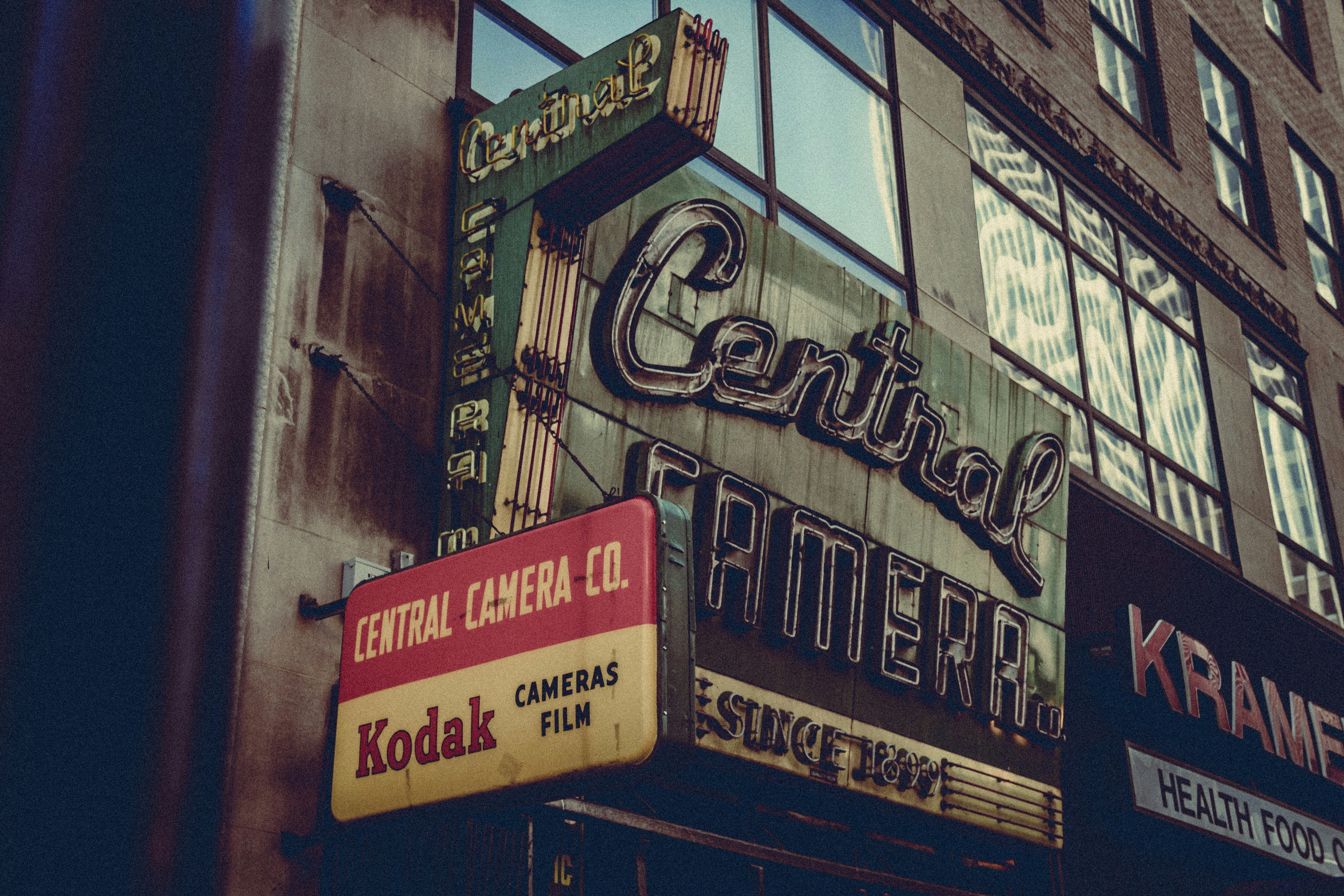 Neon Signs and Retro Signage on a Busy City Block