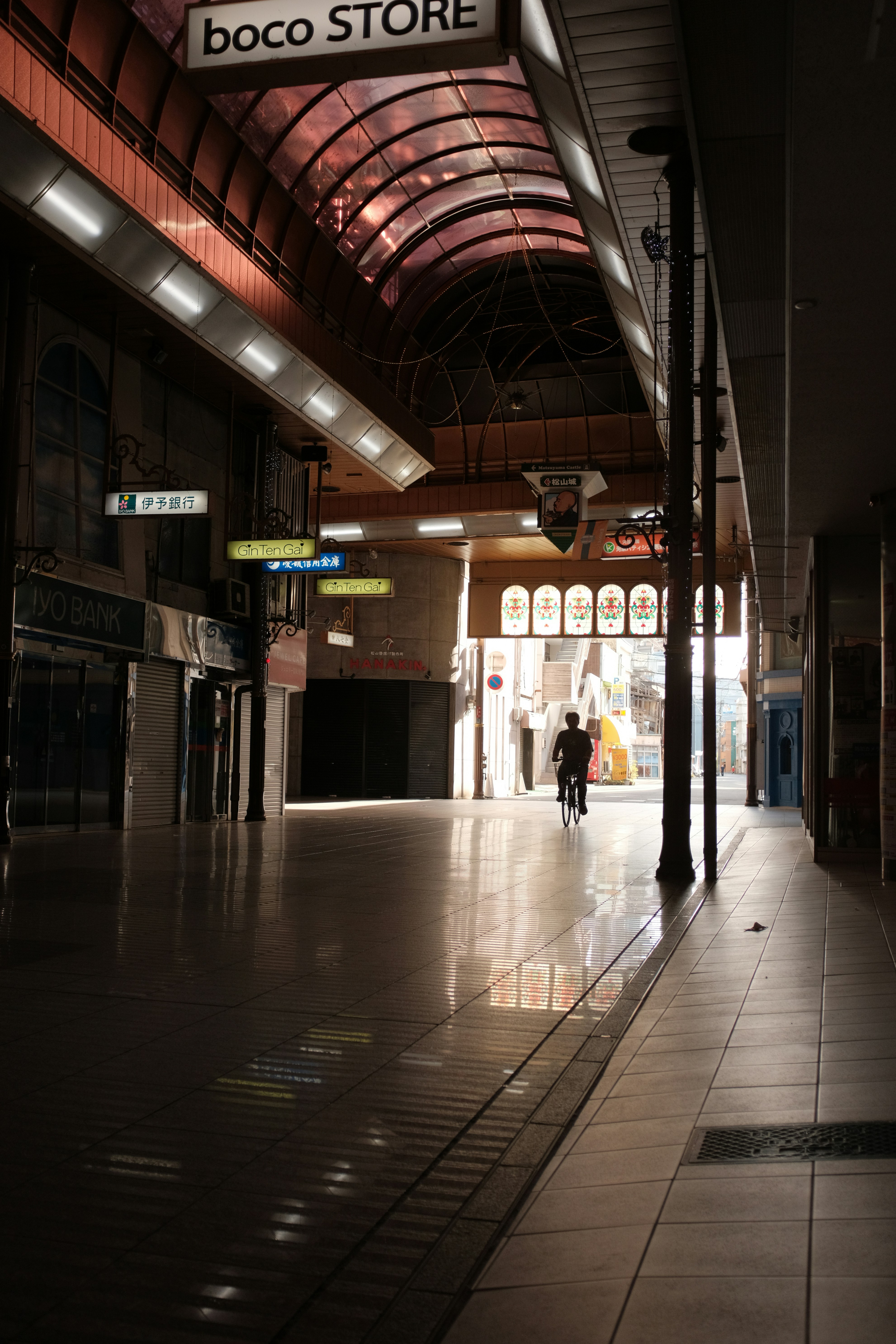 people walking on white tiled floor