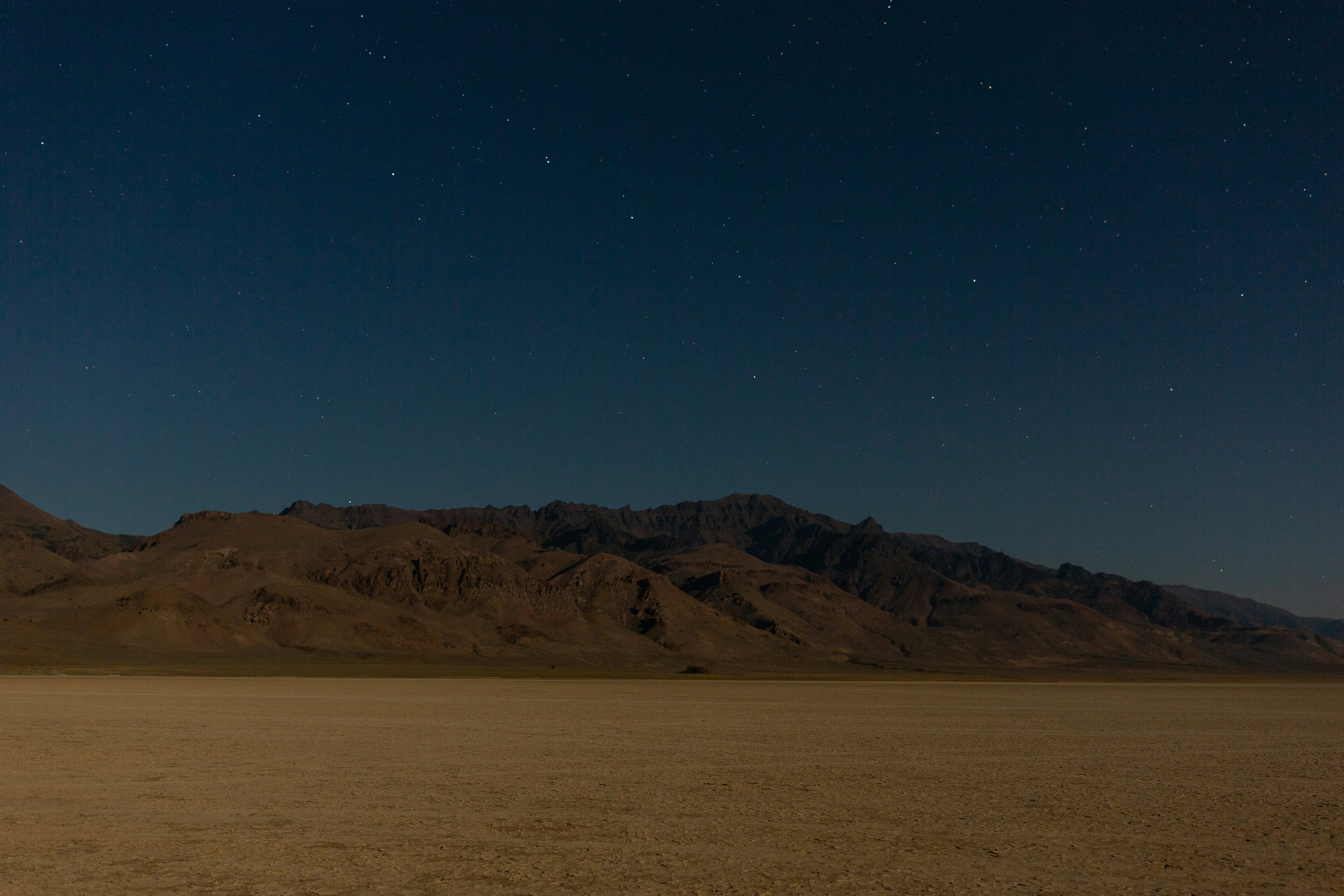 Desert Ridge Under a Starry Night