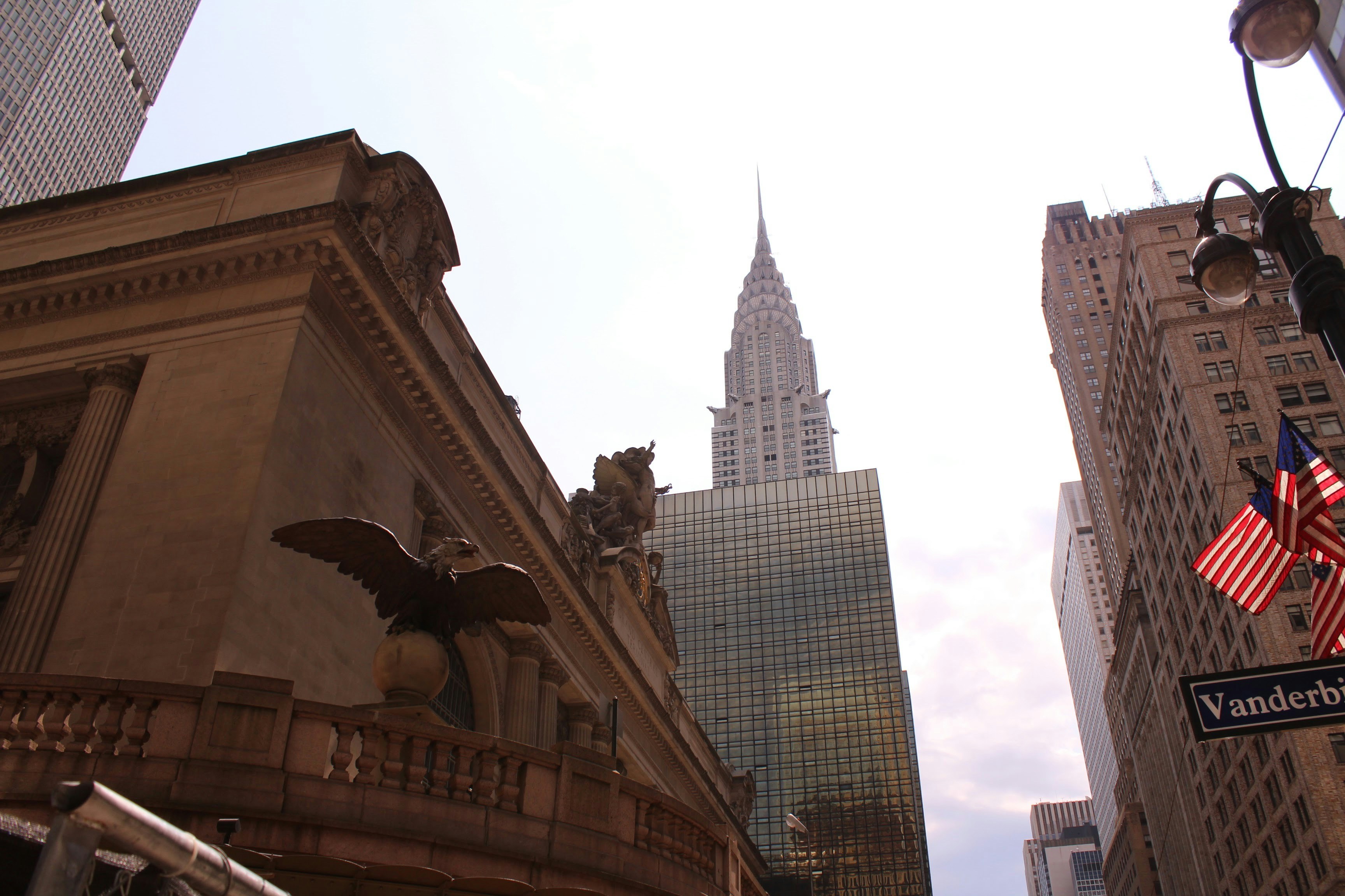 Winged Guardian Over Manhattan: Eagle Statue Framing the Chrysler Building