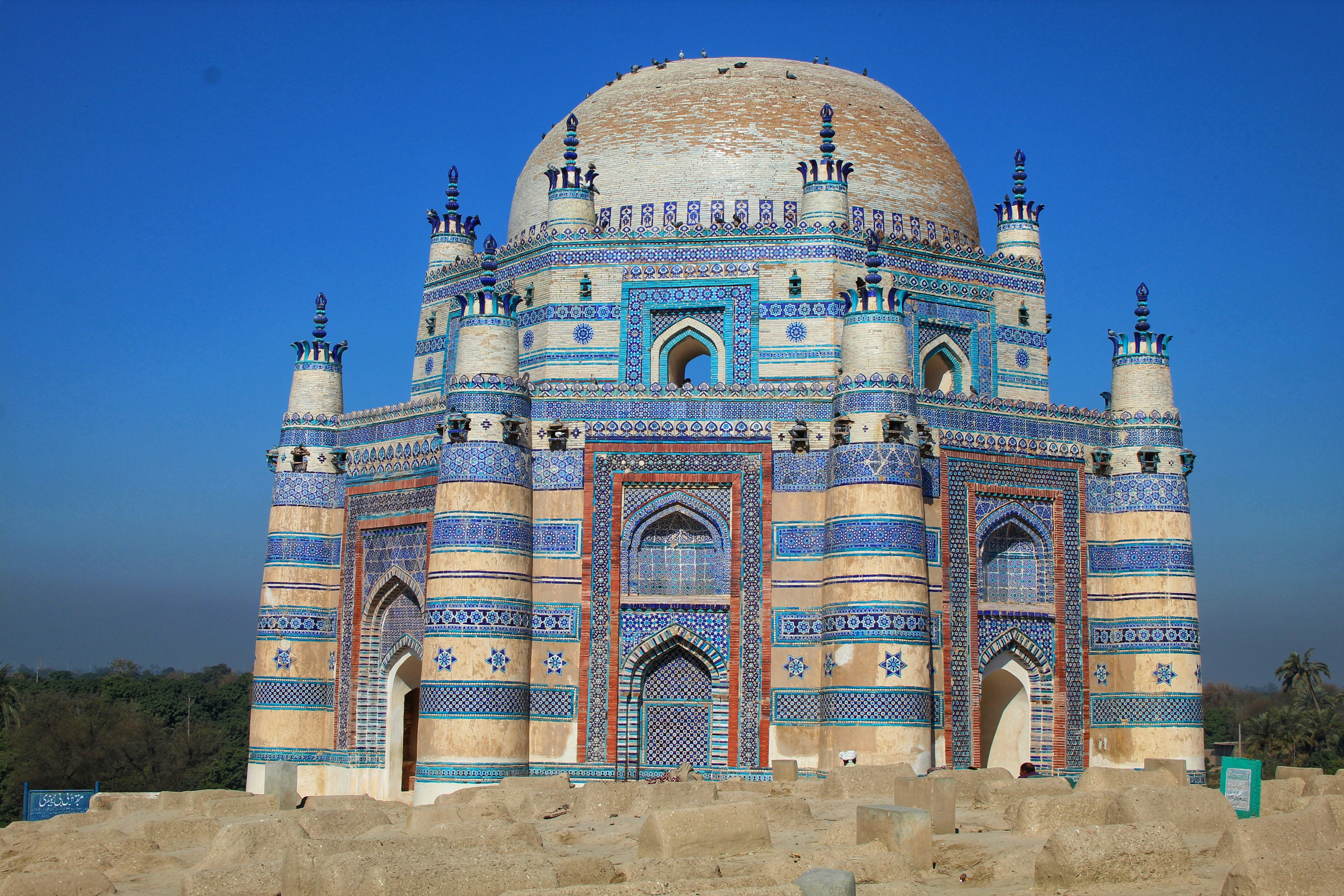 Blue-Tiled Domed Mausoleum: Geometric Harmony in Indigo Light