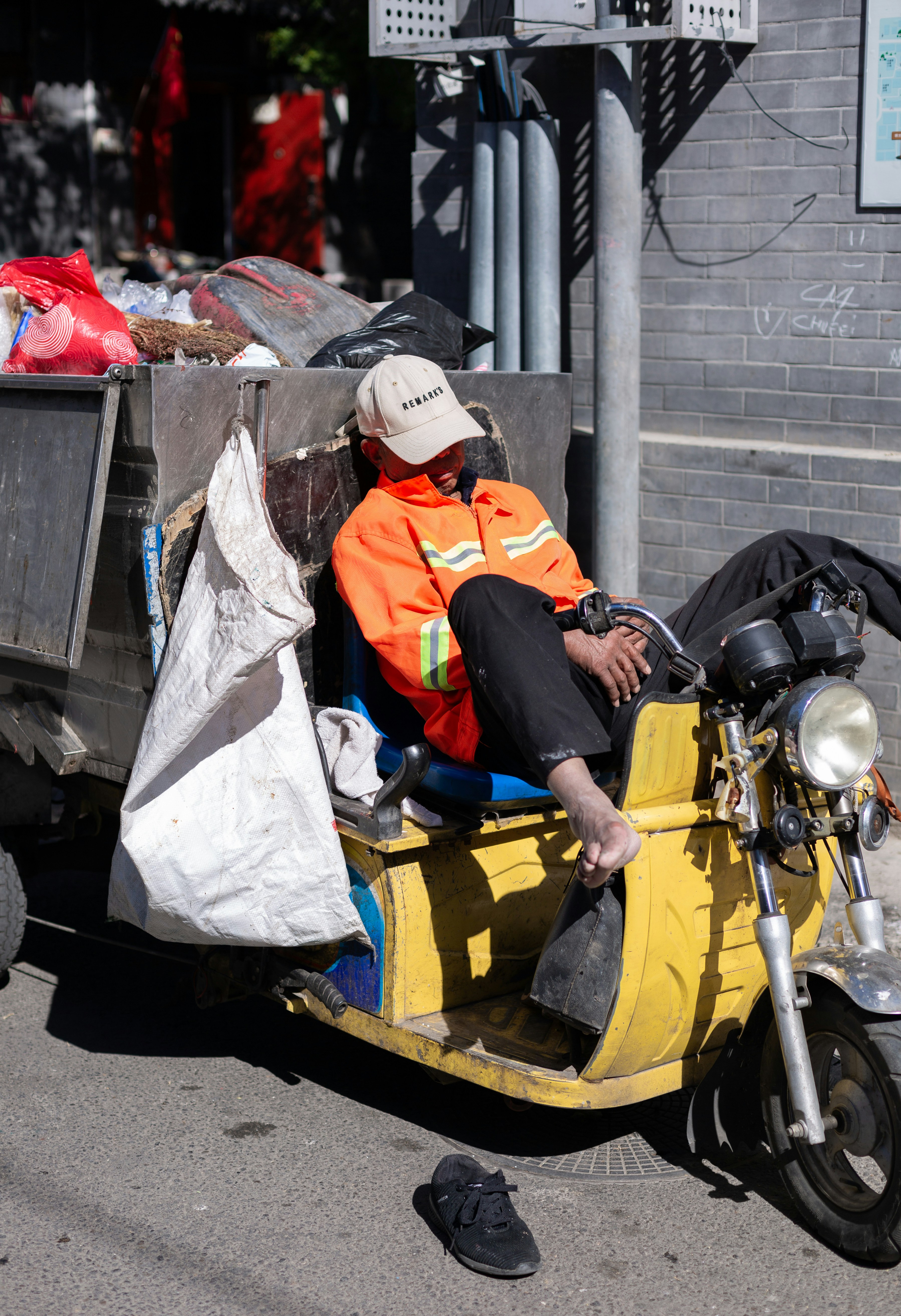 A worker takes a nap