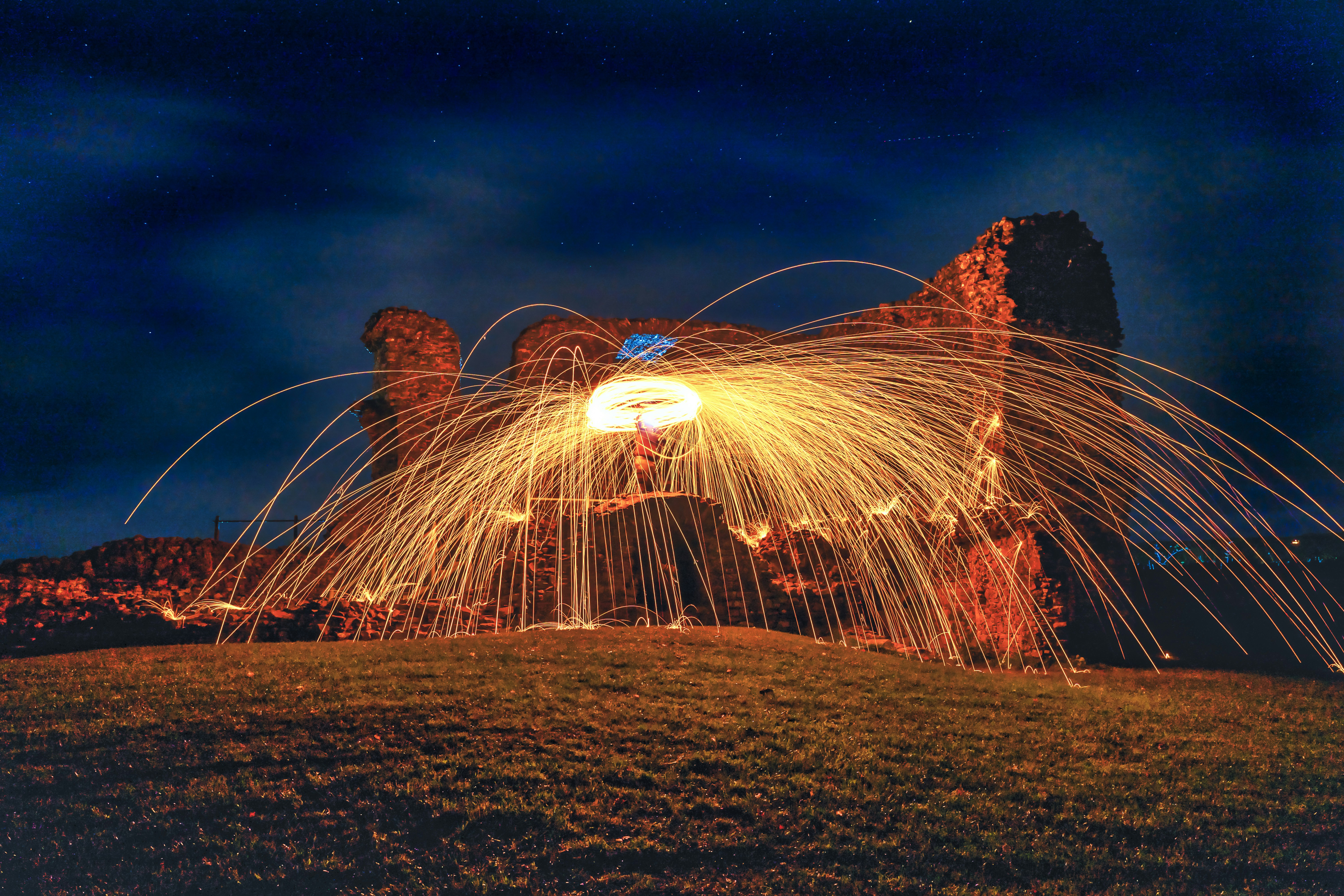 Circular Blaze Over the Stone Arch at Night