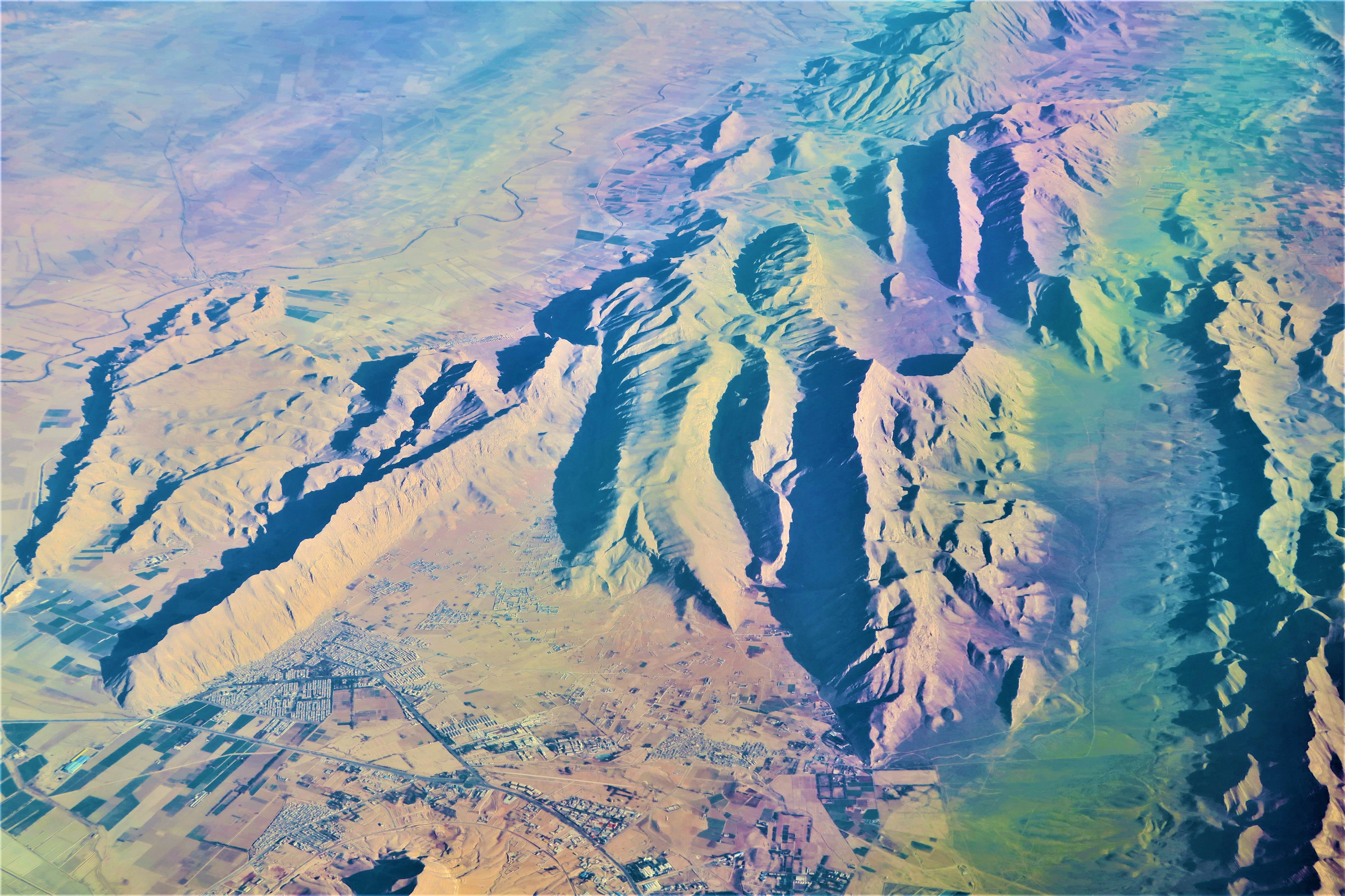 Shaded Ridges Unfold Across a Powdered Canyon Sky