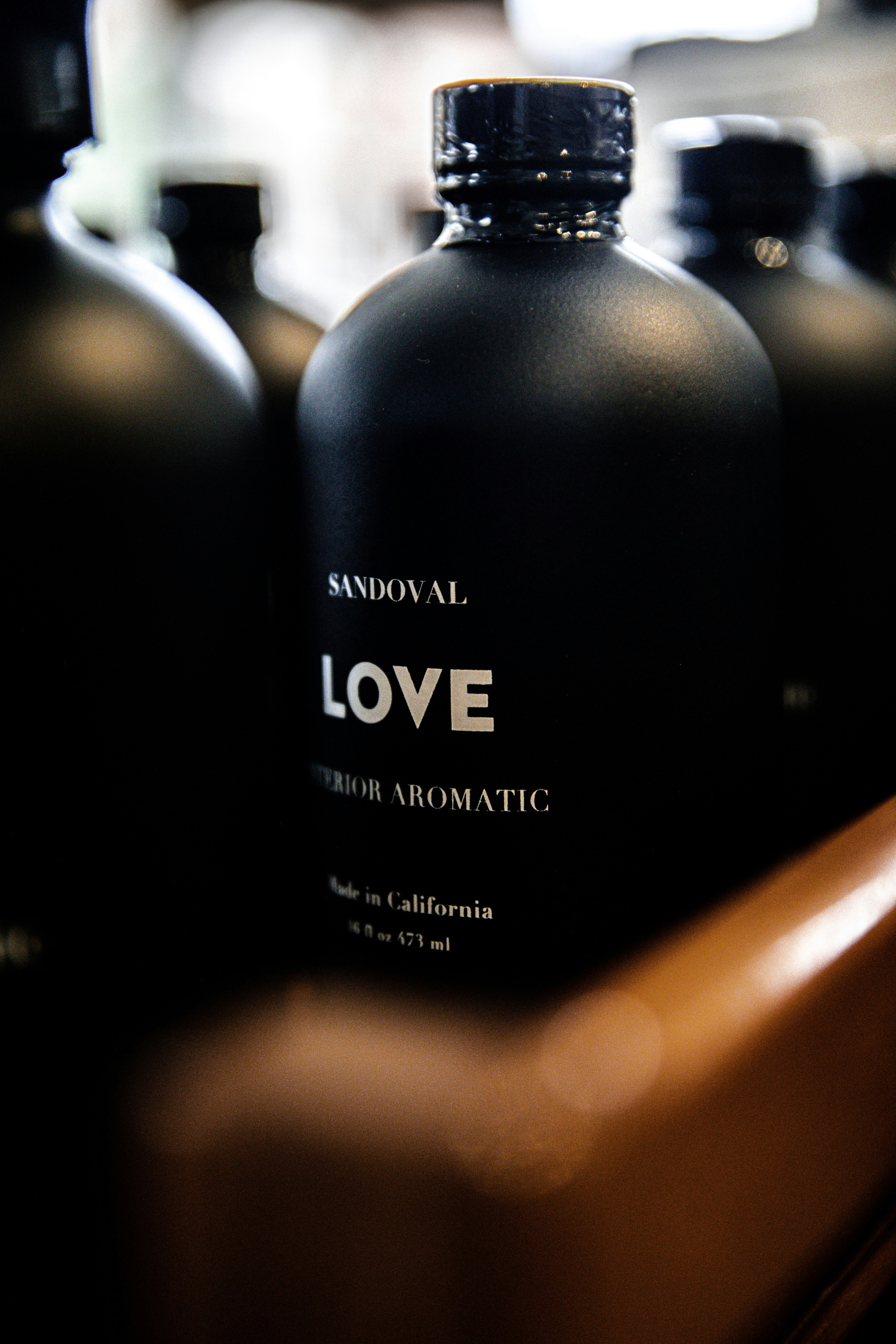 Bottle of 'LOVE' Noir: A Close-Up of Aromatic Simplicity