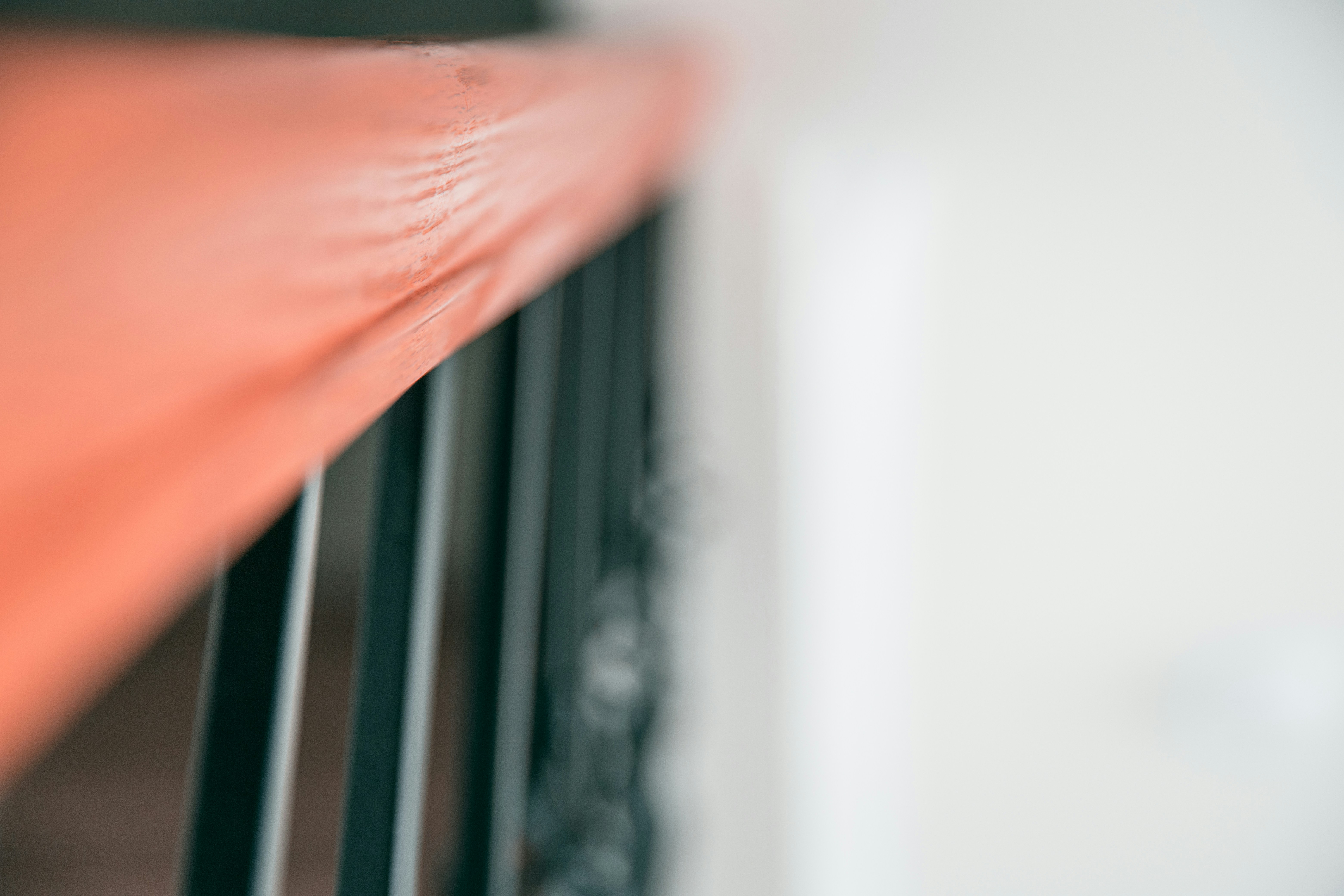 Along the Railing: A Quiet Glimpse of Color and Line