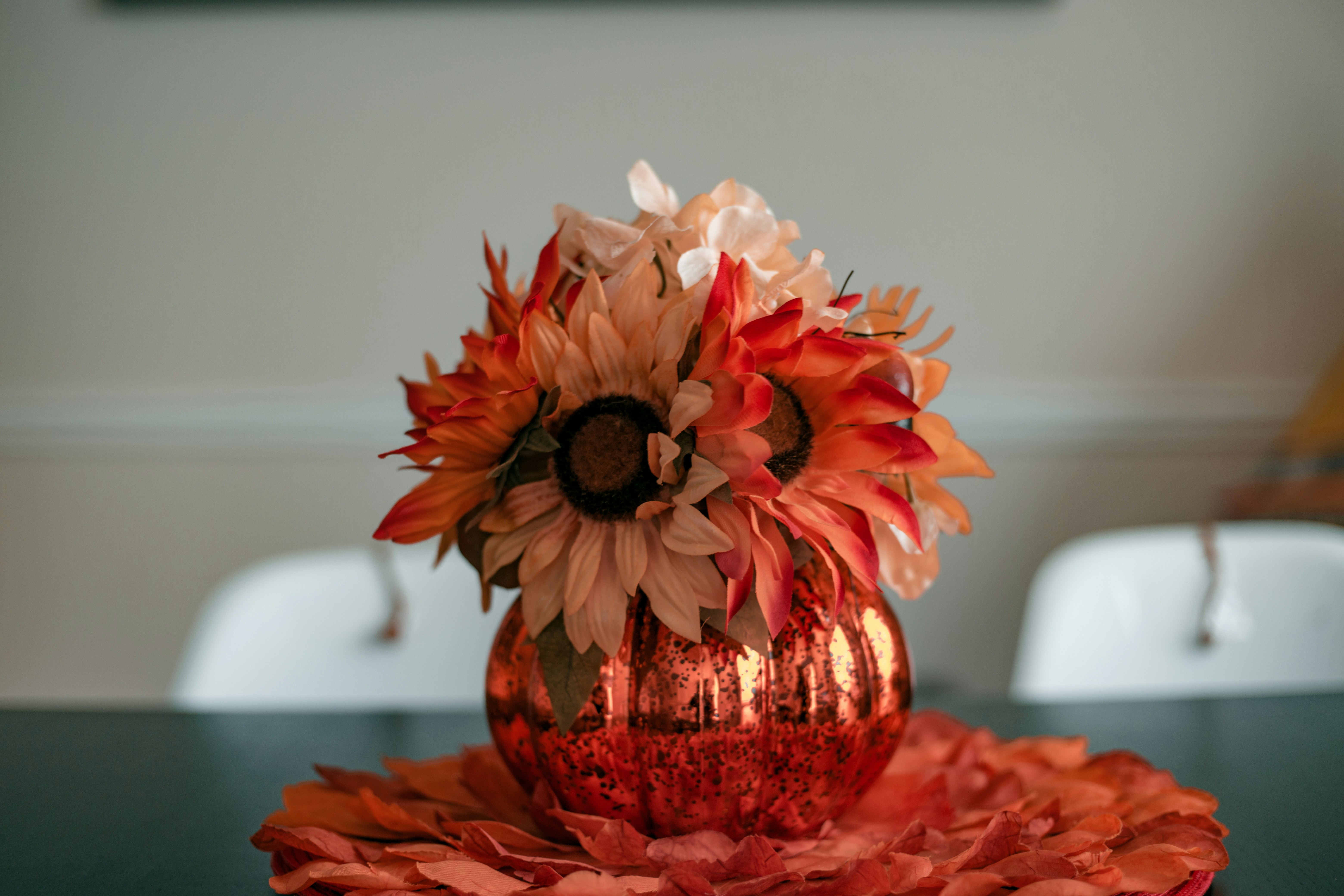 Crimson Sunflowers in a Glimmering Ruby Vase