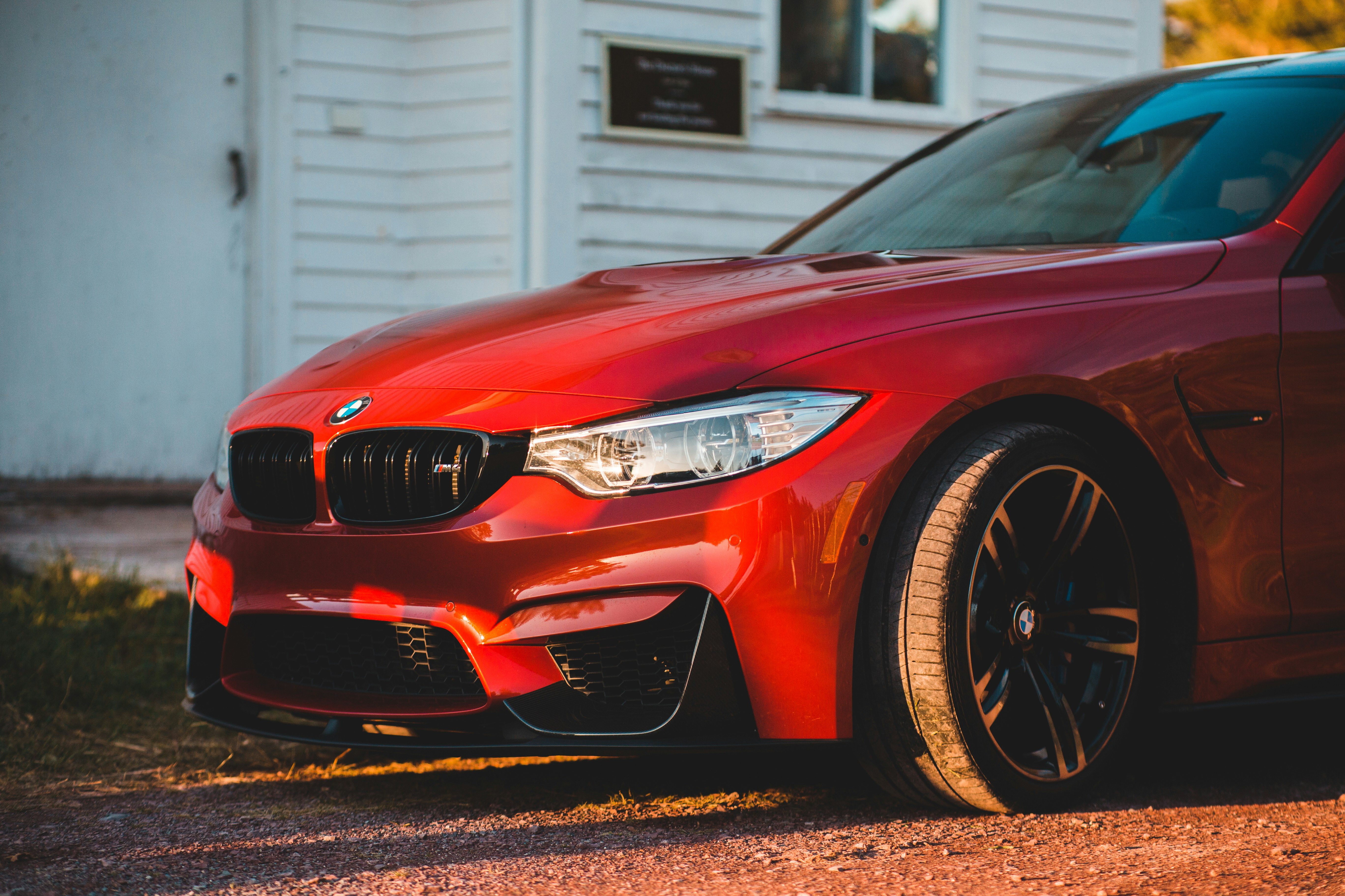 Red bmw m 3 parked on road during daytime photo – Free Vehicle Image on ...