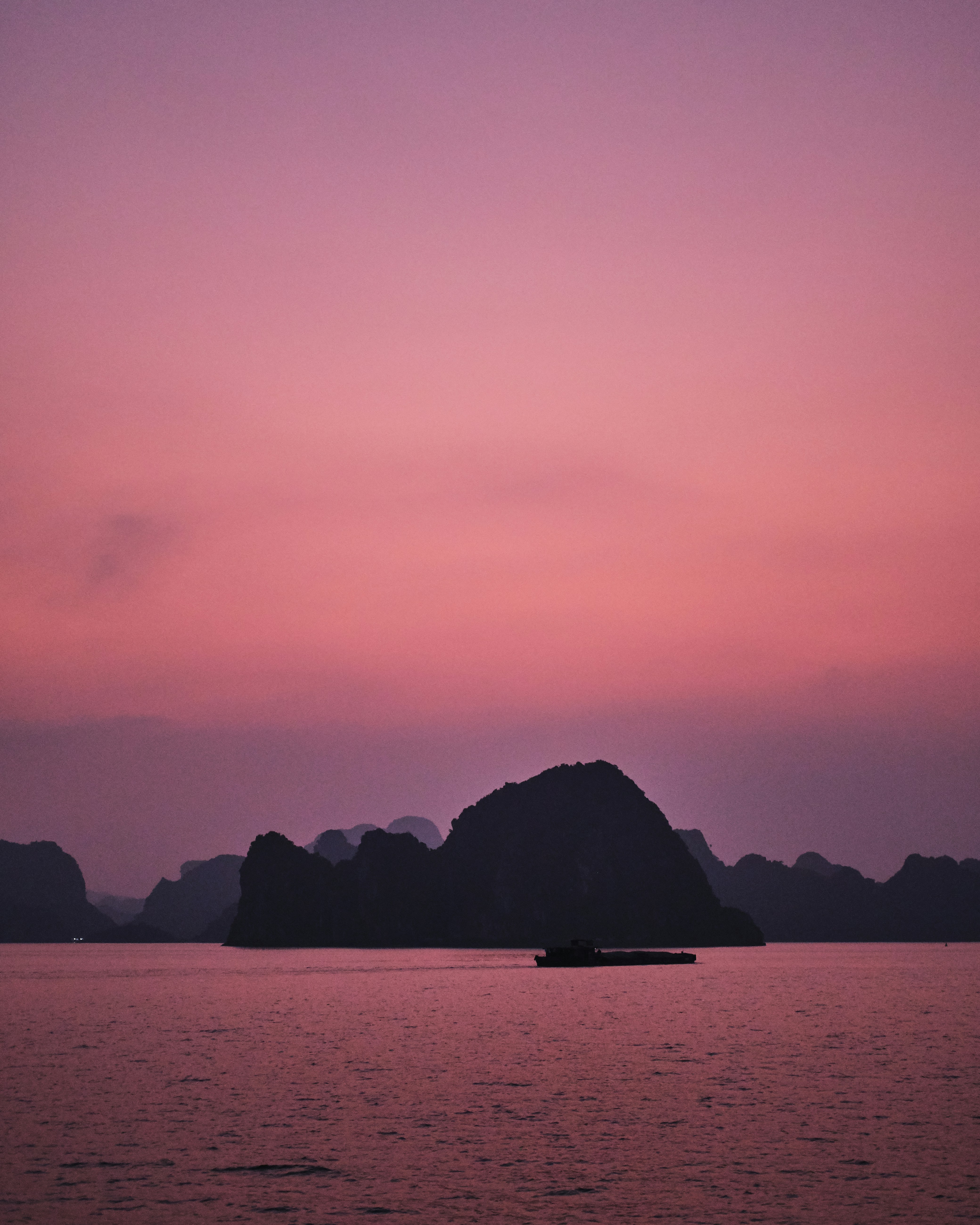 Coral Sky over the Quiet Archipelago at Dusk