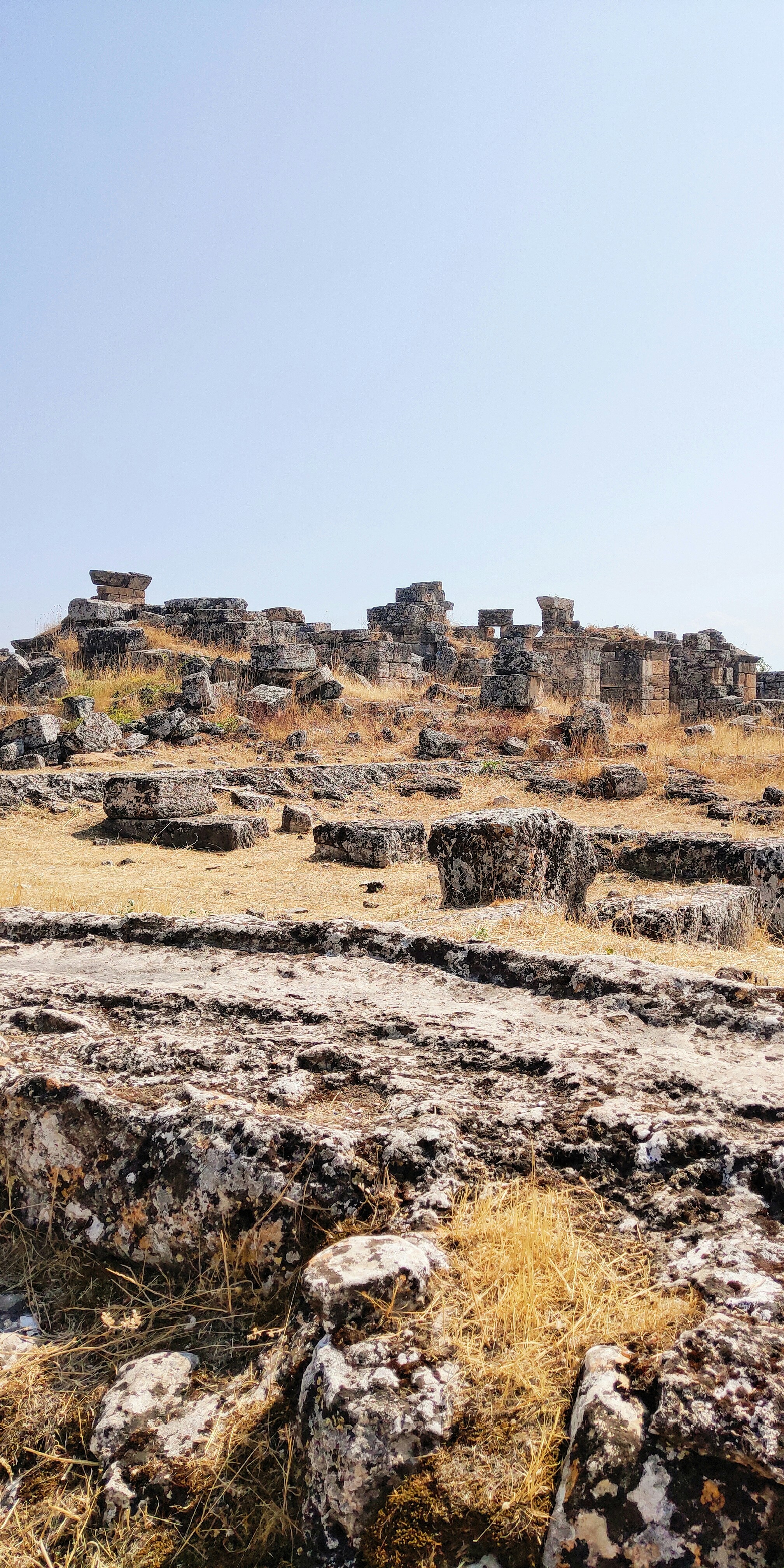 brown rock formation under blue sky during daytime