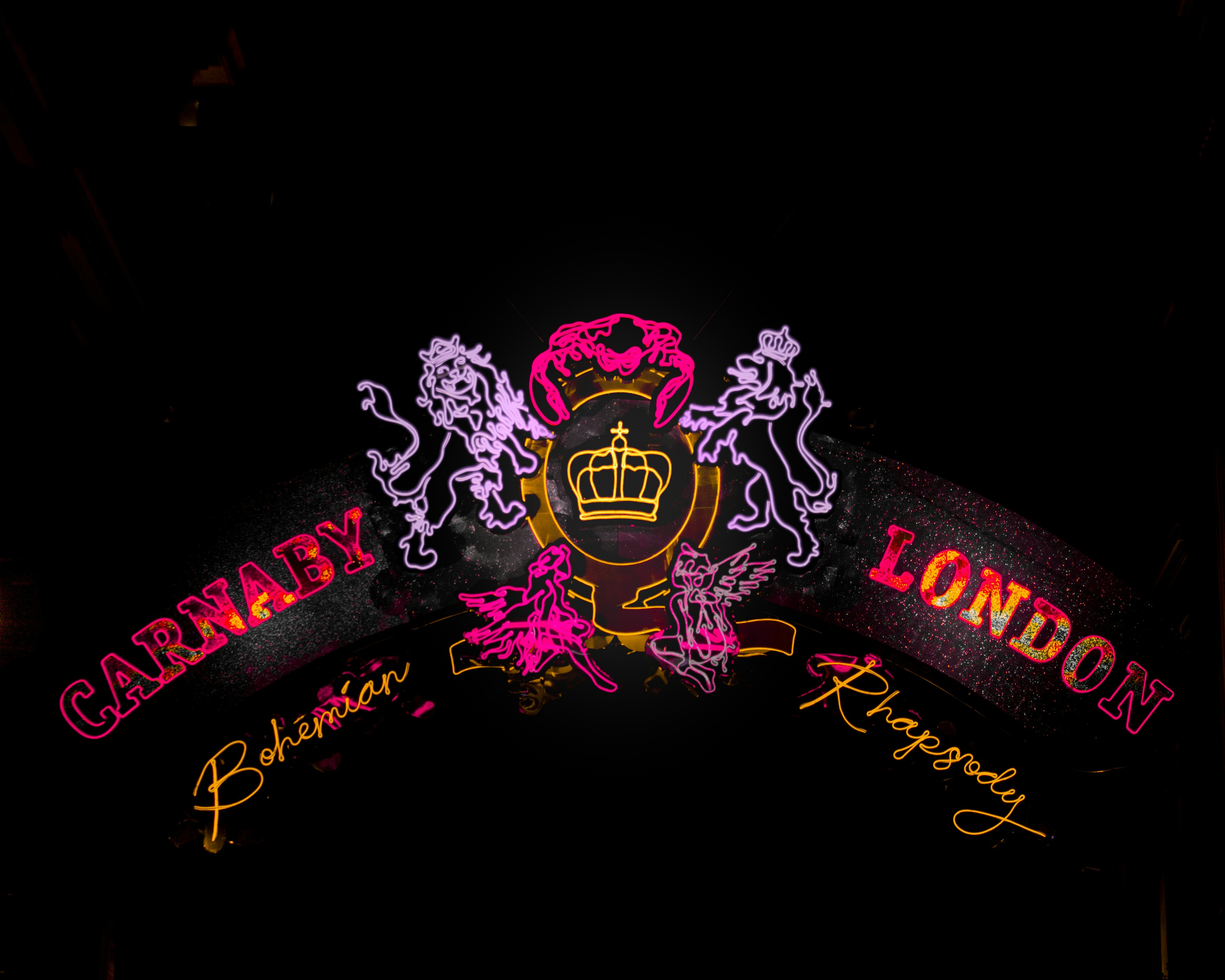 Carnaby Neon Crest: Regal Signage Beneath the Night