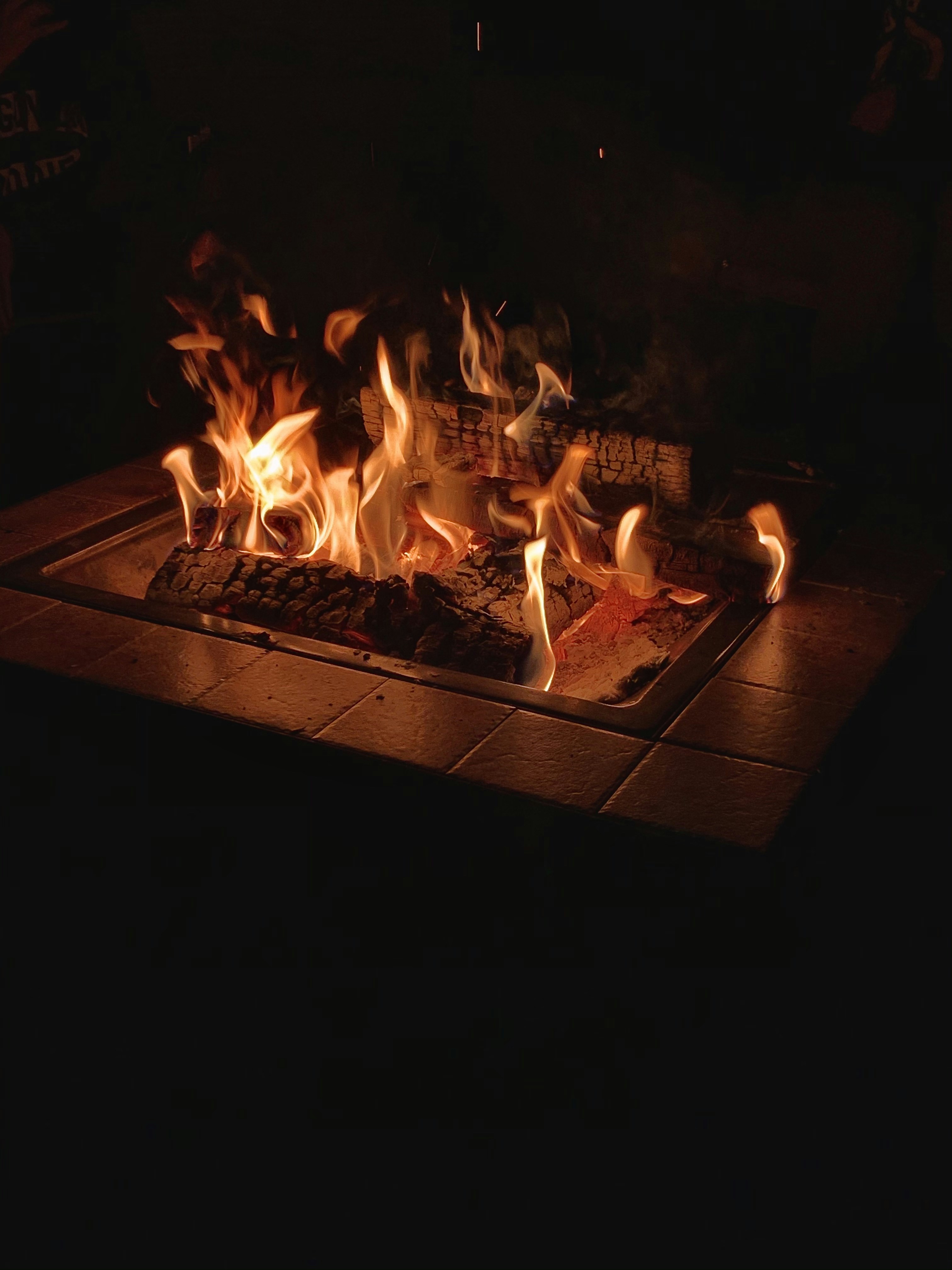fire on brown wooden table