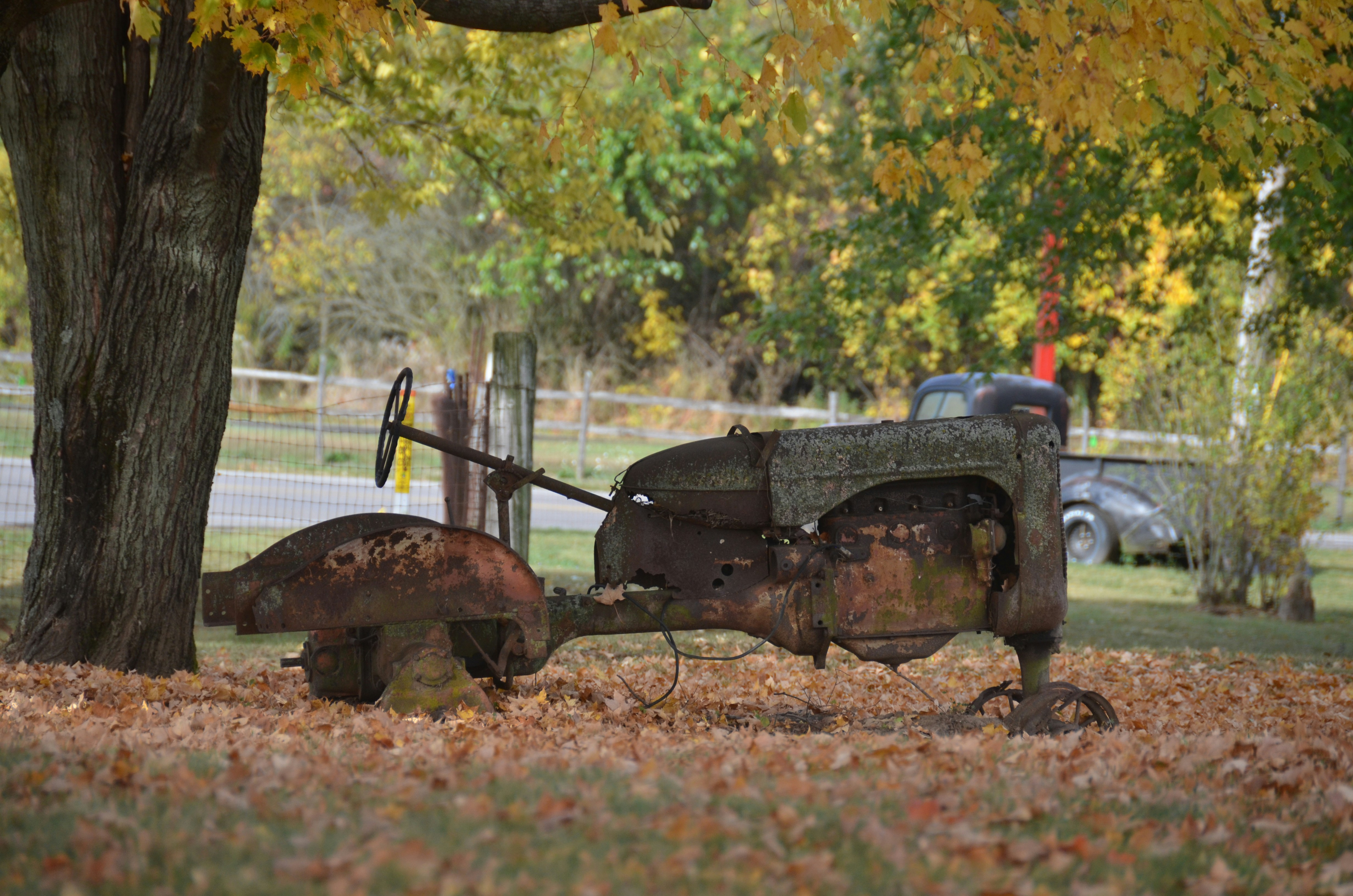 Rusting Power: A Quiet Tractor Resigned to Autumn