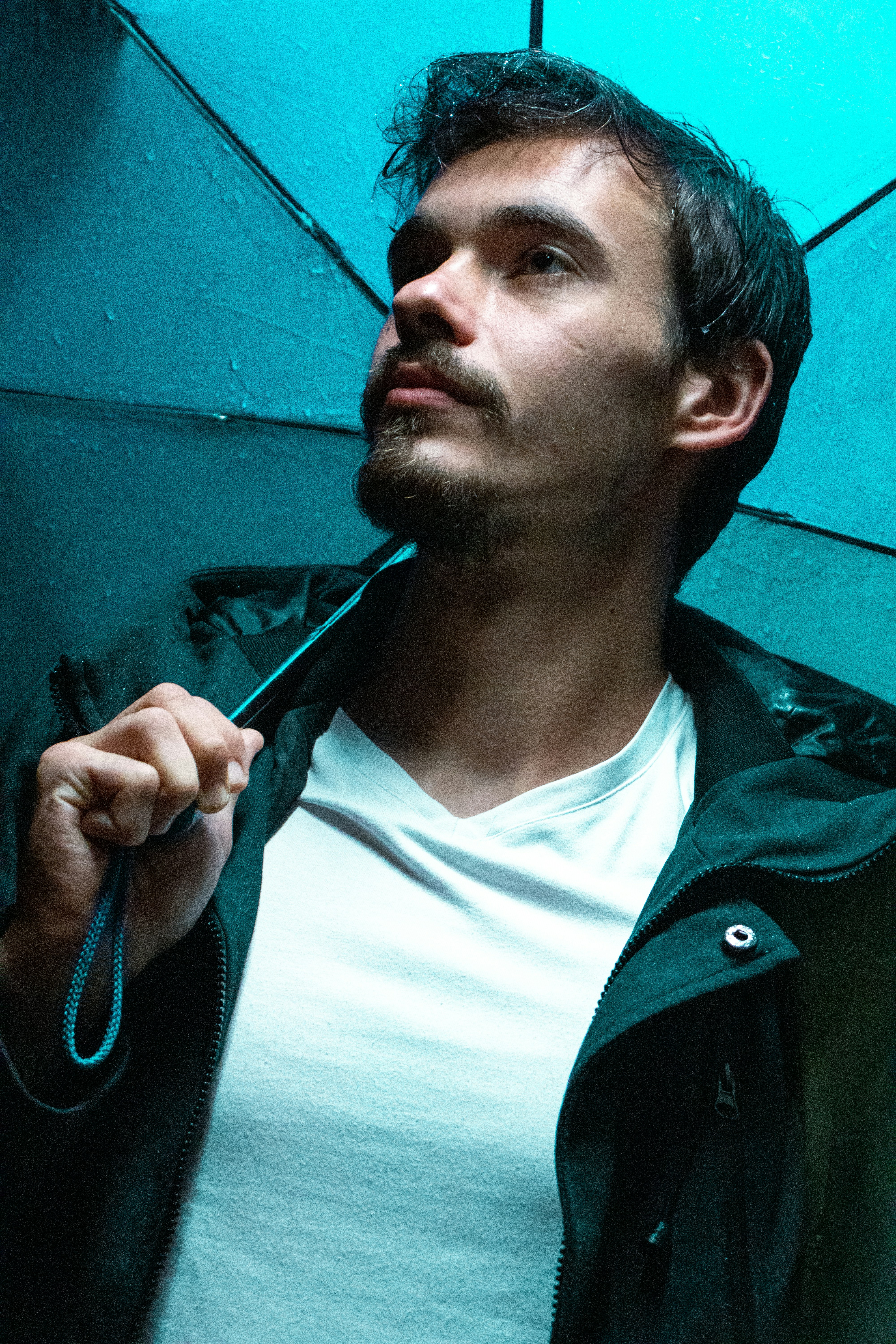 Neon Twilight Portrait: A Cyan-lit Gaze