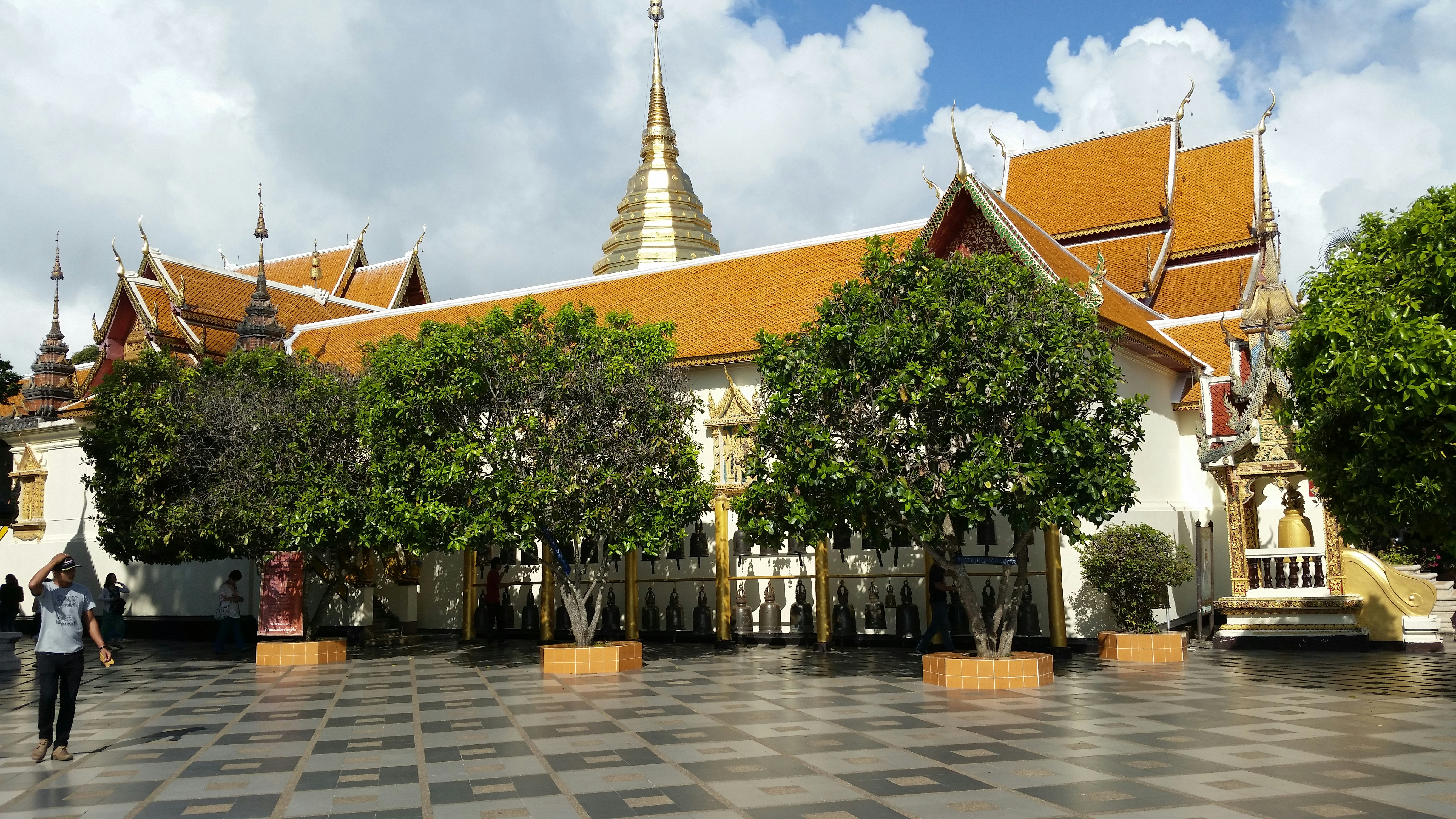 Golden Spire Rising Over a Checkered Temple Courtyard